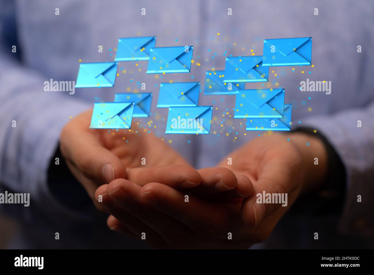 Holding email icons - the concept of digital communication Stock Photo ...