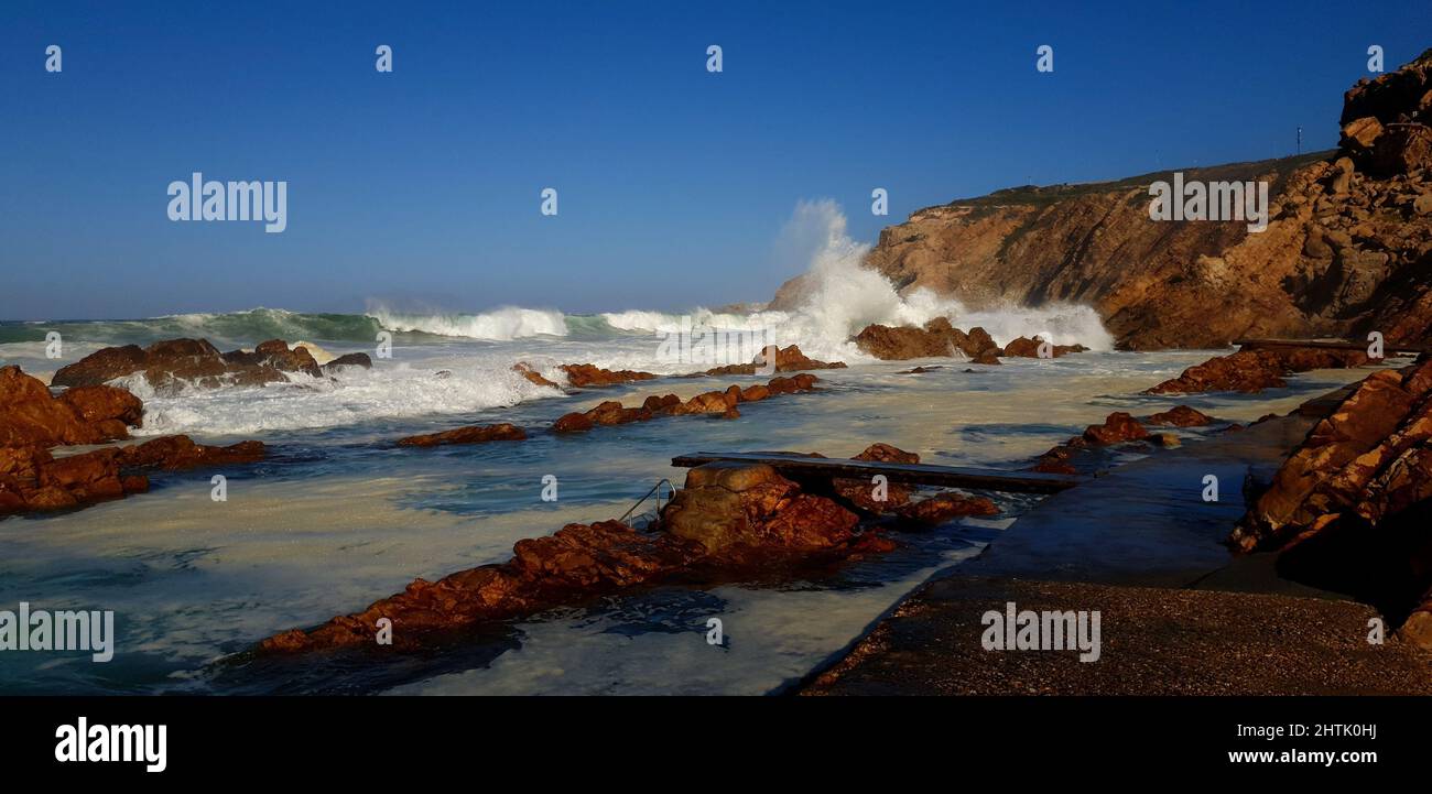 Foam Thrown in Air When Hitting Rocks Stock Photo - Alamy