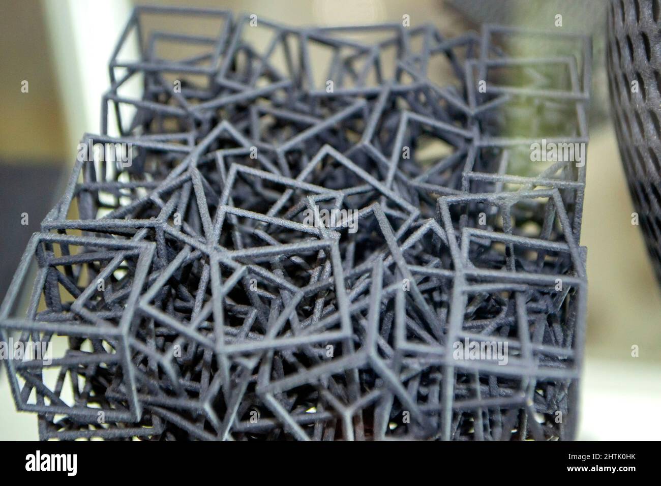 Gray abstract model object printed on 3d printer from powder close-up ...