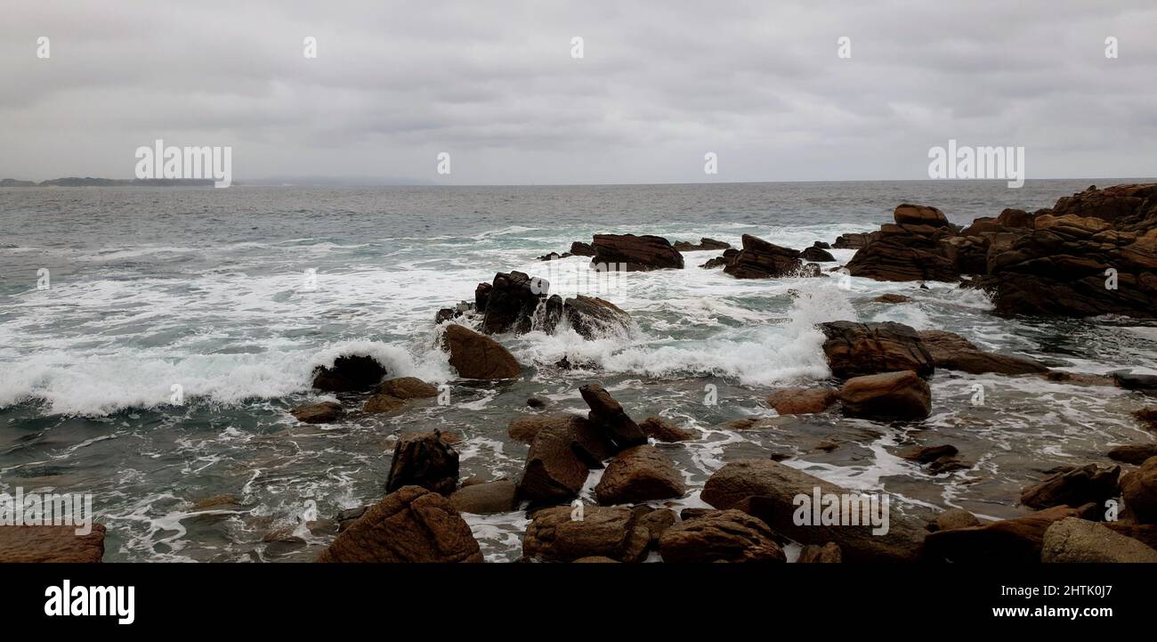 Foam Thrown in Air When Hitting Rocks Stock Photo - Alamy