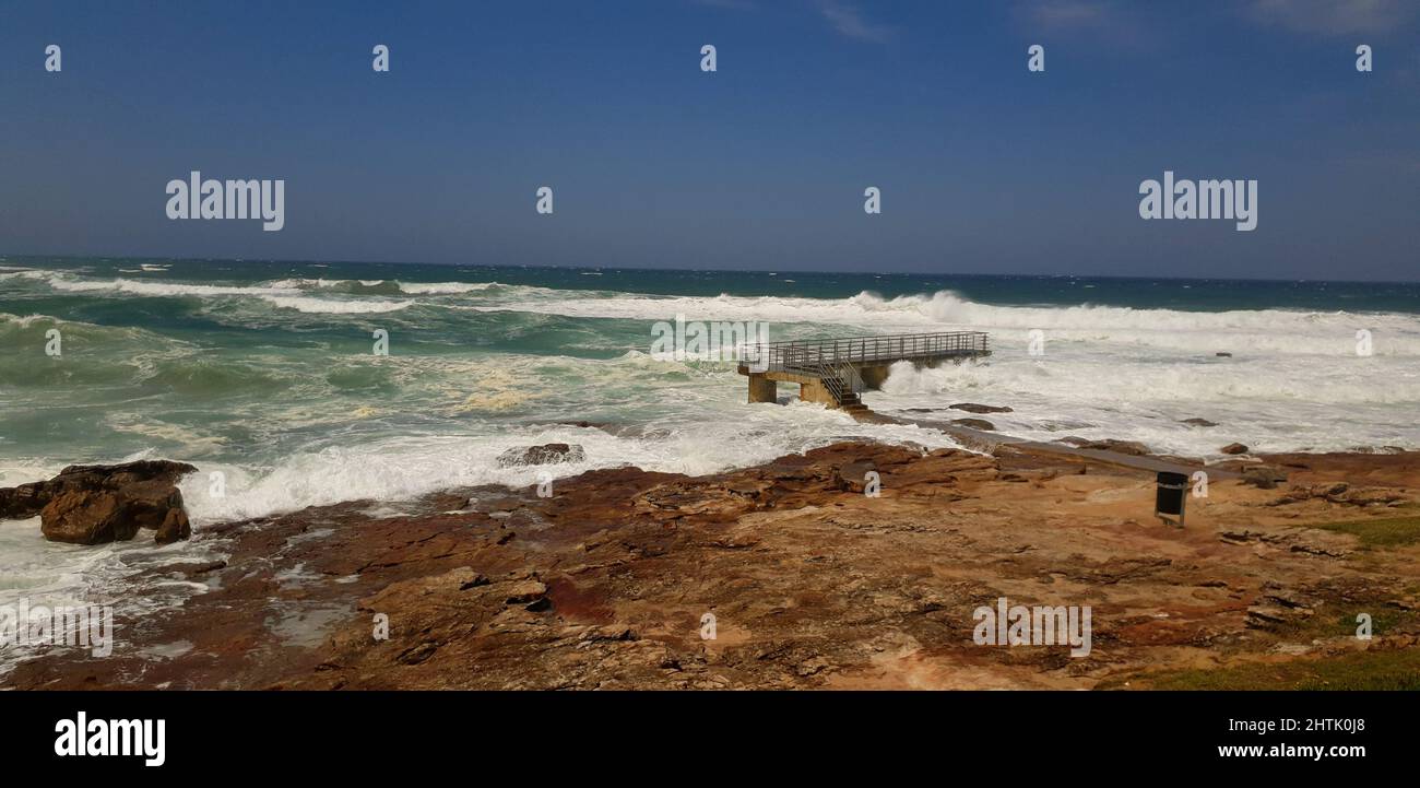 Foam Thrown in Air When Hitting Rocks Stock Photo - Alamy