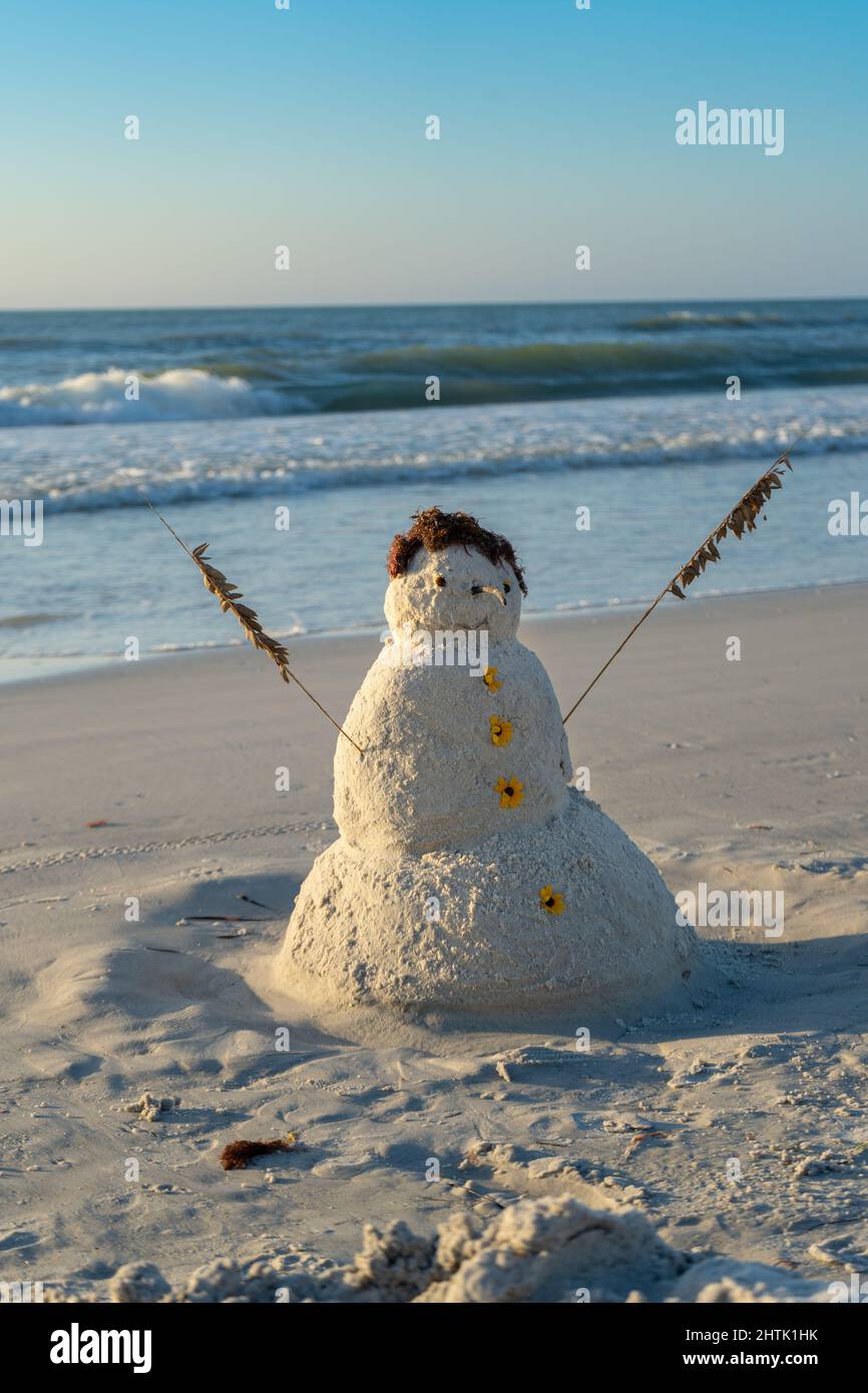 Snowman made sand on beach hi-res stock photography and images - Alamy