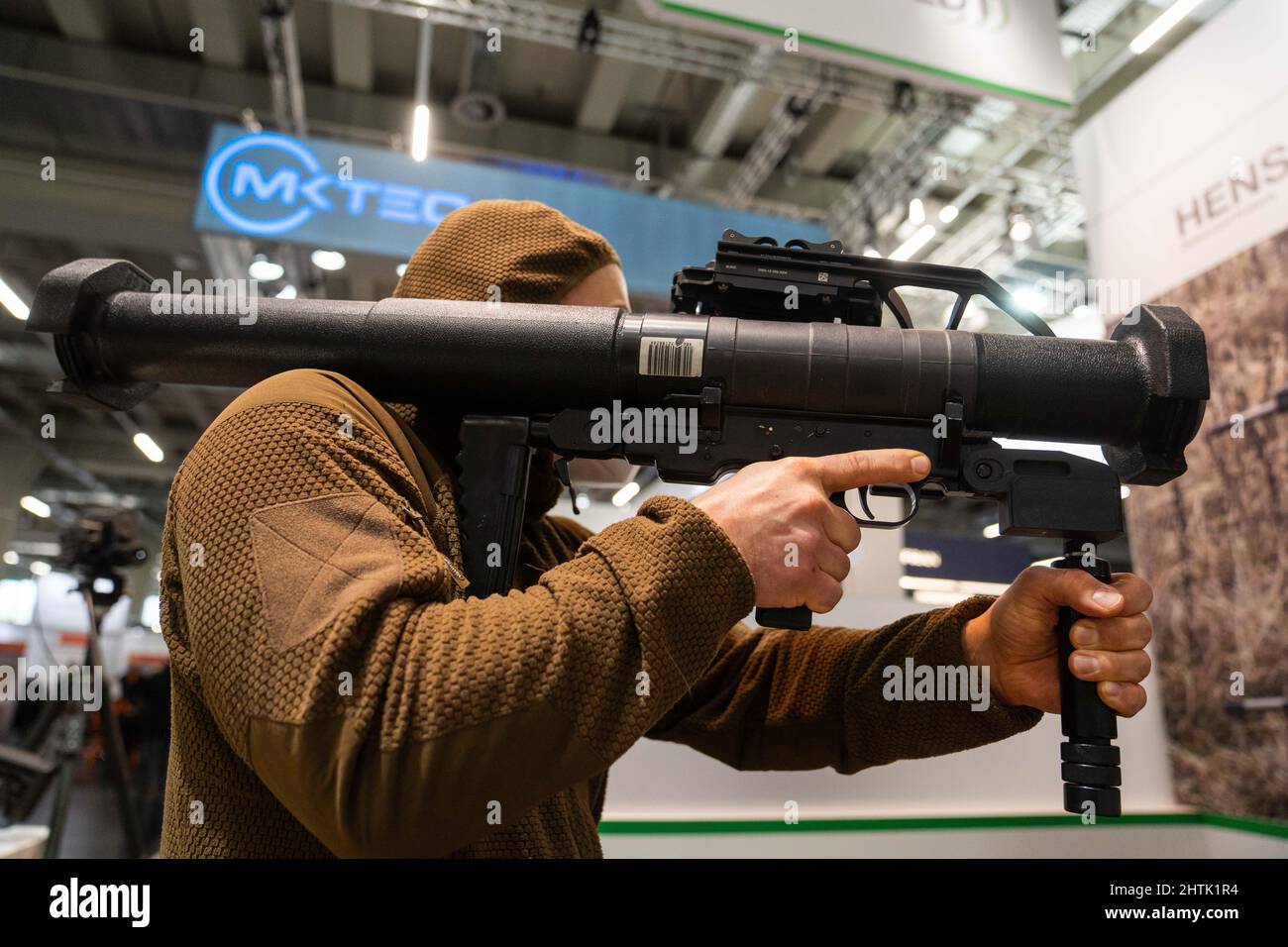 Nuremberg, Germany. 01st Mar, 2022. A man holds Dynamit Nobel Defence ...