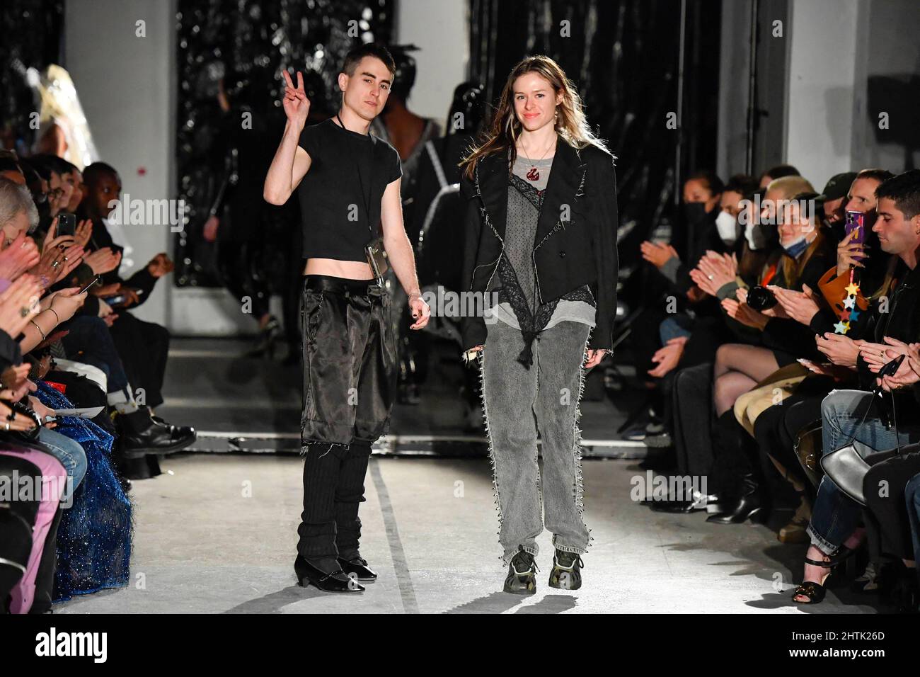 Designer Patric DiCaprio and Claire Sullivan walks on the runway at the ...