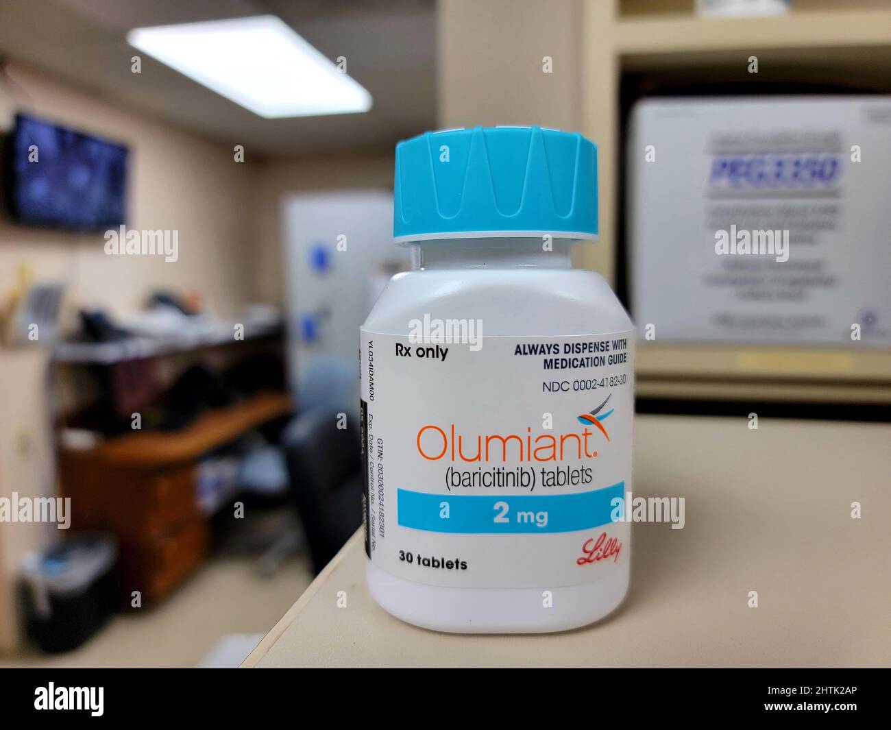 Shallow focus of a white medicine jar of Olumiant 2mg Tablets ...
