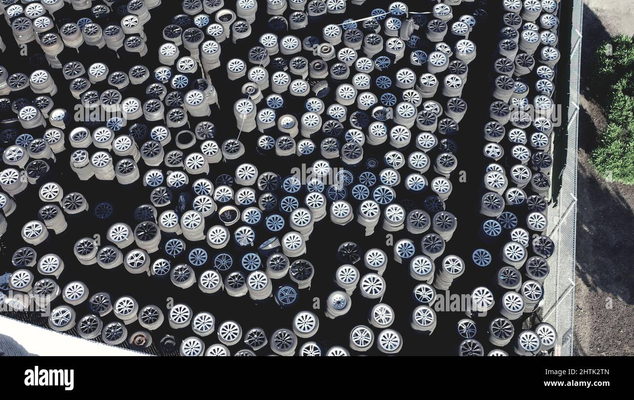 used alloy wheels rims with tires from top view background Stock Photo ...