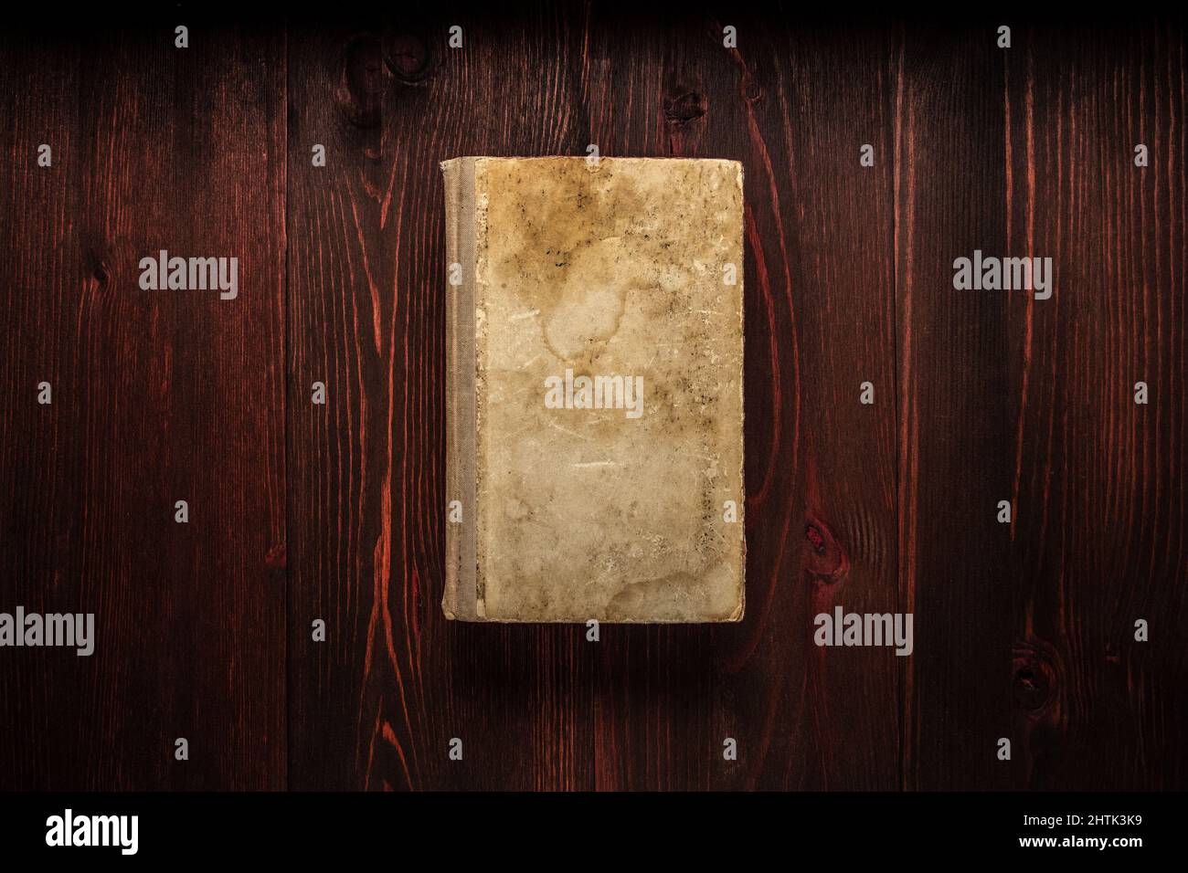 Vintage wooden background. Old book on the wooden table. Closed book ...