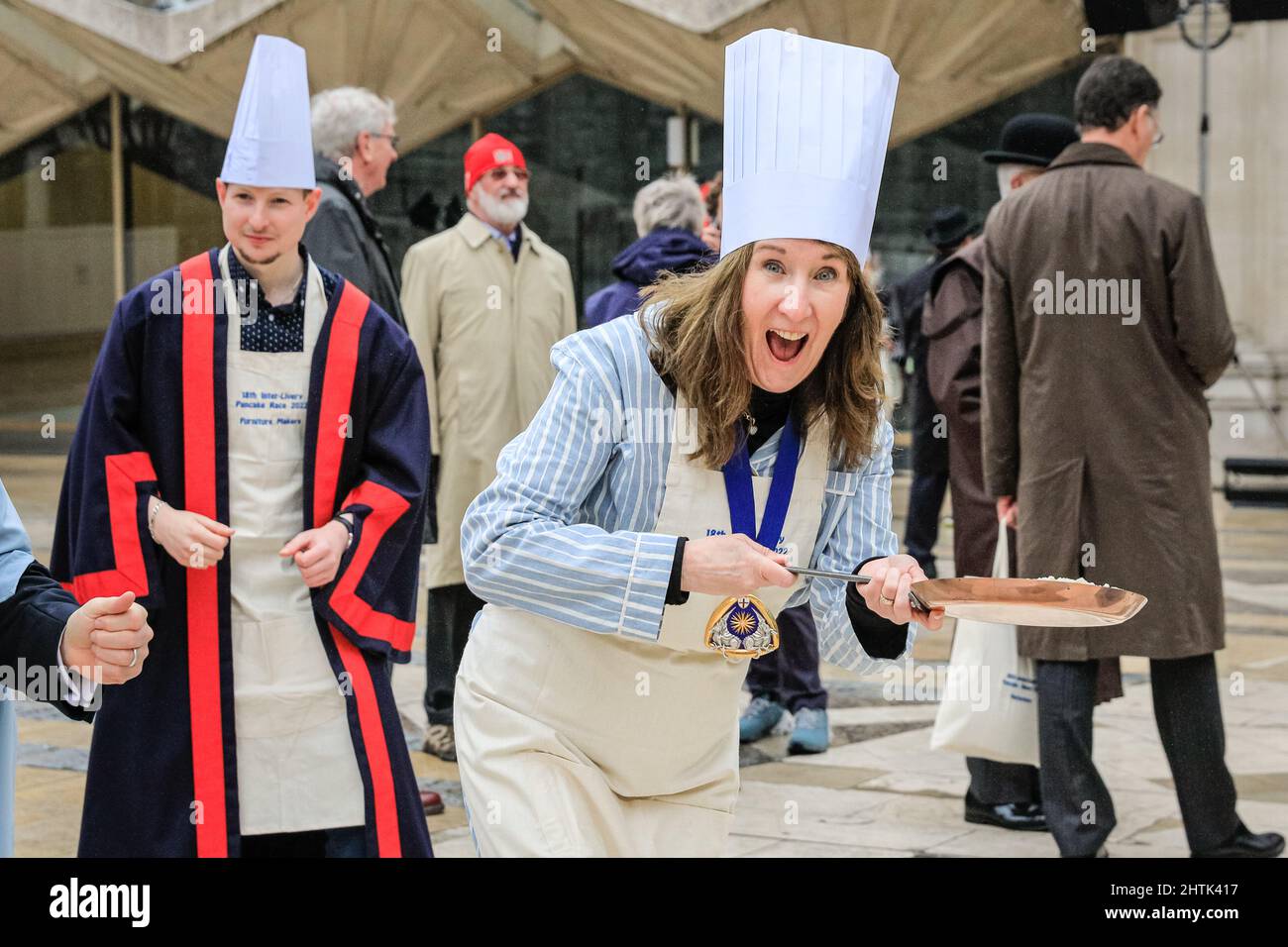 London, UK. 01st Mar, 2022. A participant does a short pancake tossing ...