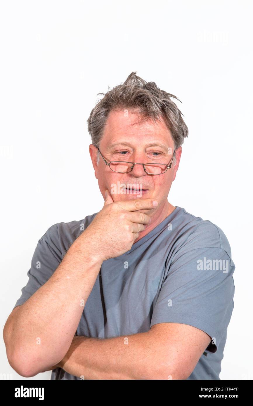 portrait of man in sorrow in studio Stock Photo - Alamy