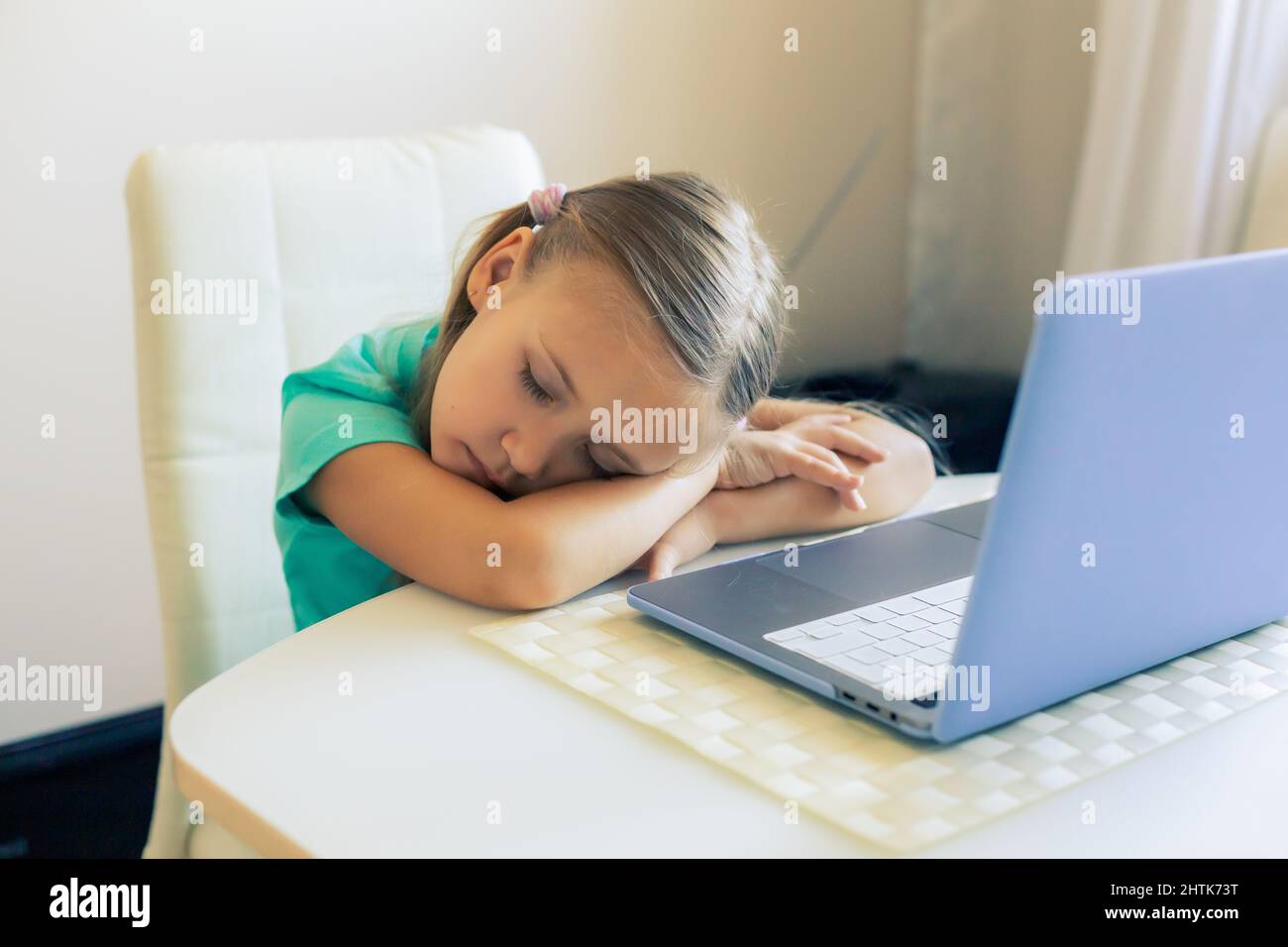Little cute girl uses laptop to have video call Stock Photo - Alamy