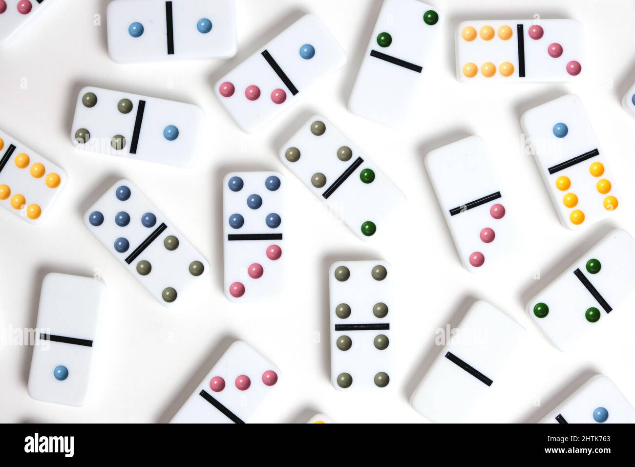 Dominoes with colorful coloring on a white background Stock Photo - Alamy