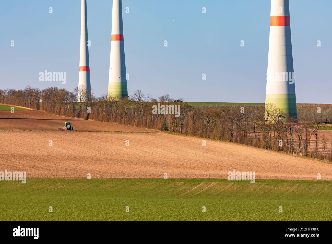 Massive towers of wind power spoil nature Stock Photo - Alamy