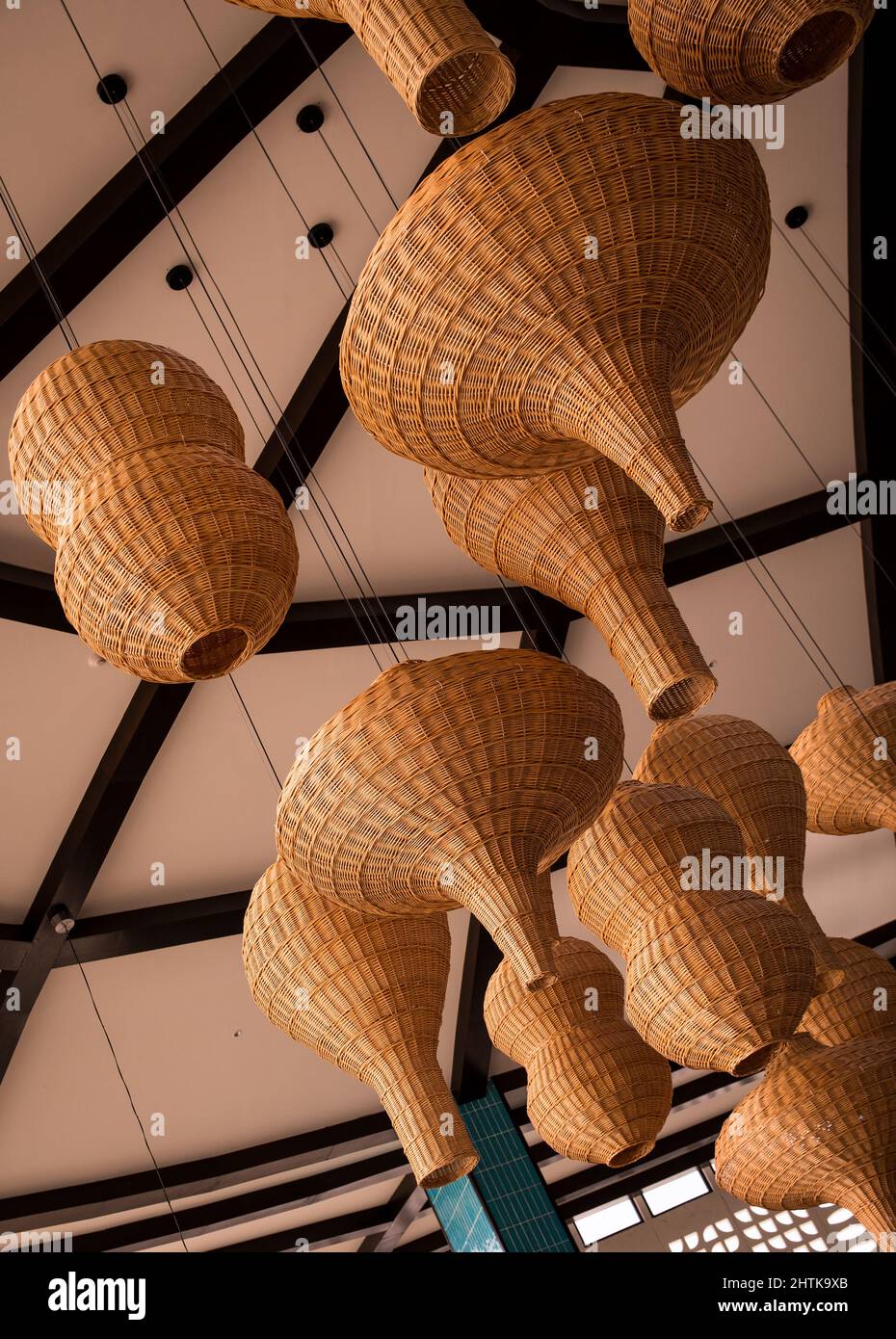 Vertical low angle shot of hanging decorative wicker lanterns Stock ...