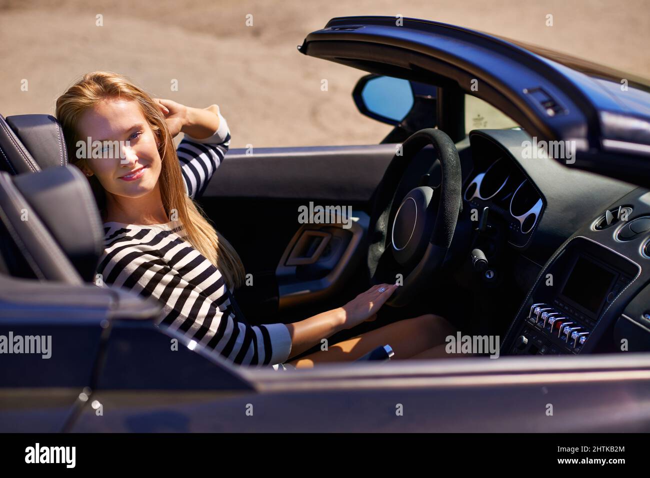 Woman driving sports car alone hi-res stock photography and images - Alamy