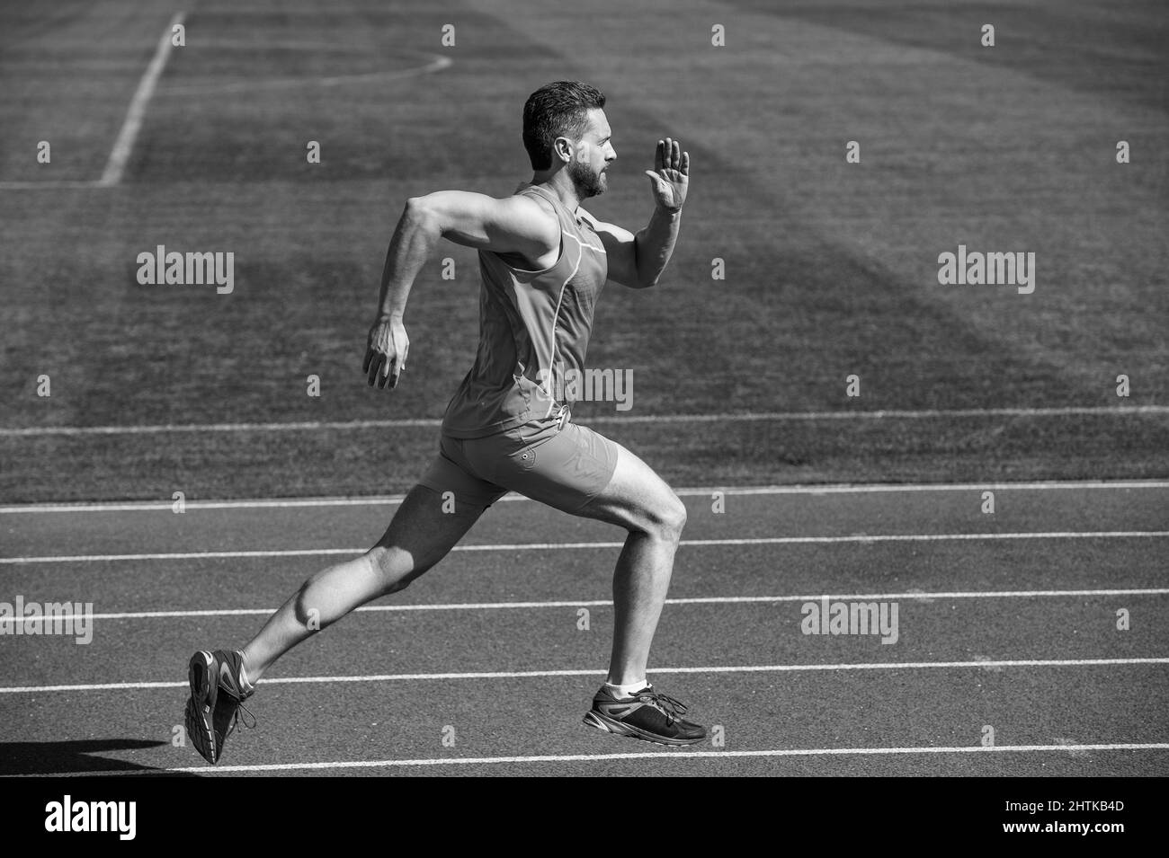 Great progress. muscular guy run to success. man running on stadium ...