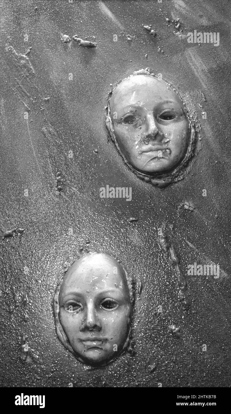 relief of a two man faces image Stock Photo - Alamy