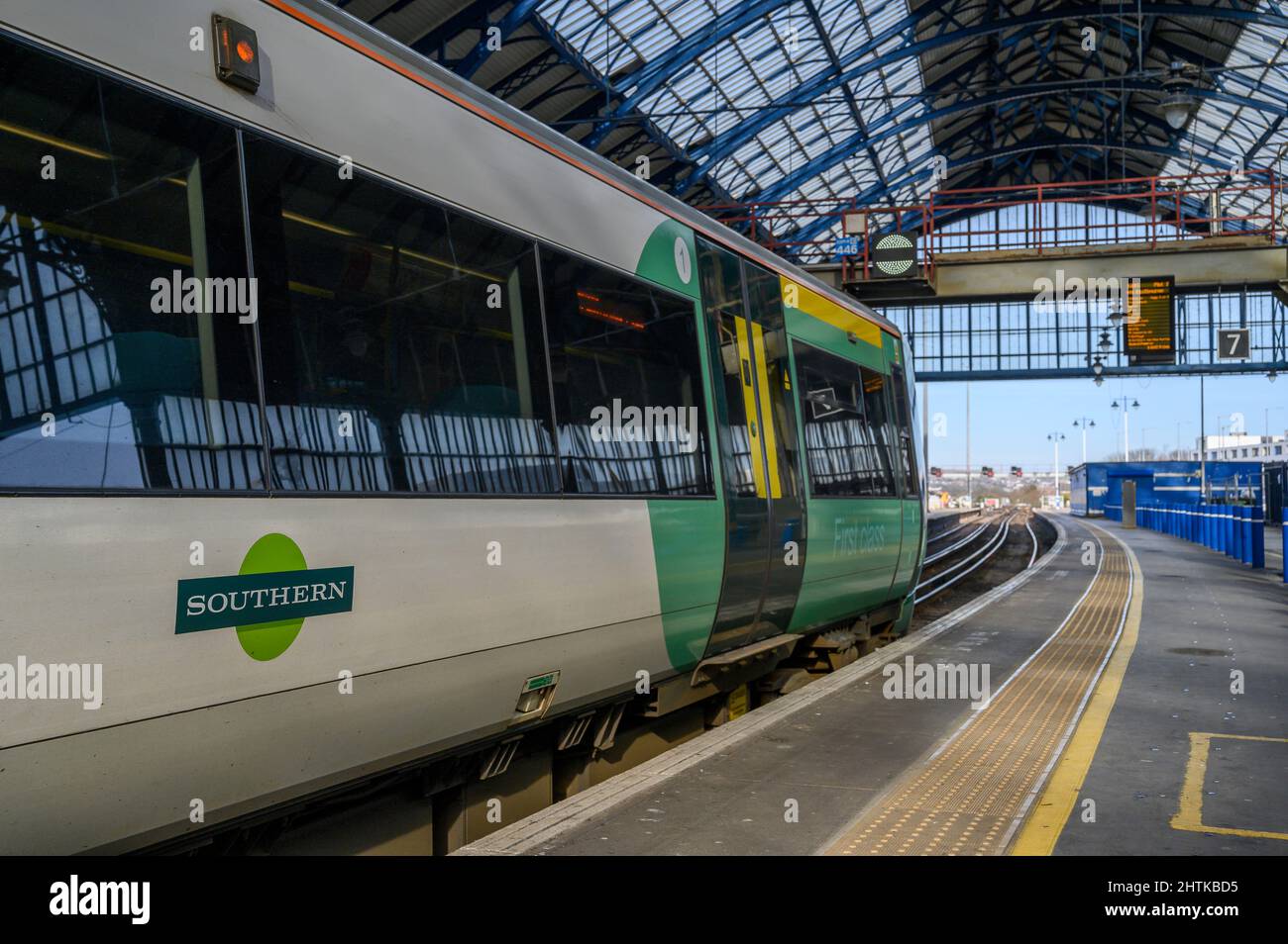 British rail class 377 train in Southern livery waiting at a platform ...