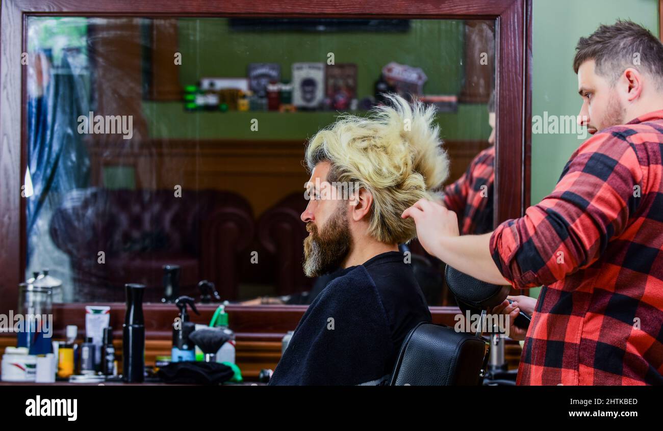 brutal bearded man at hairdresser salon with master, grooming Stock ...