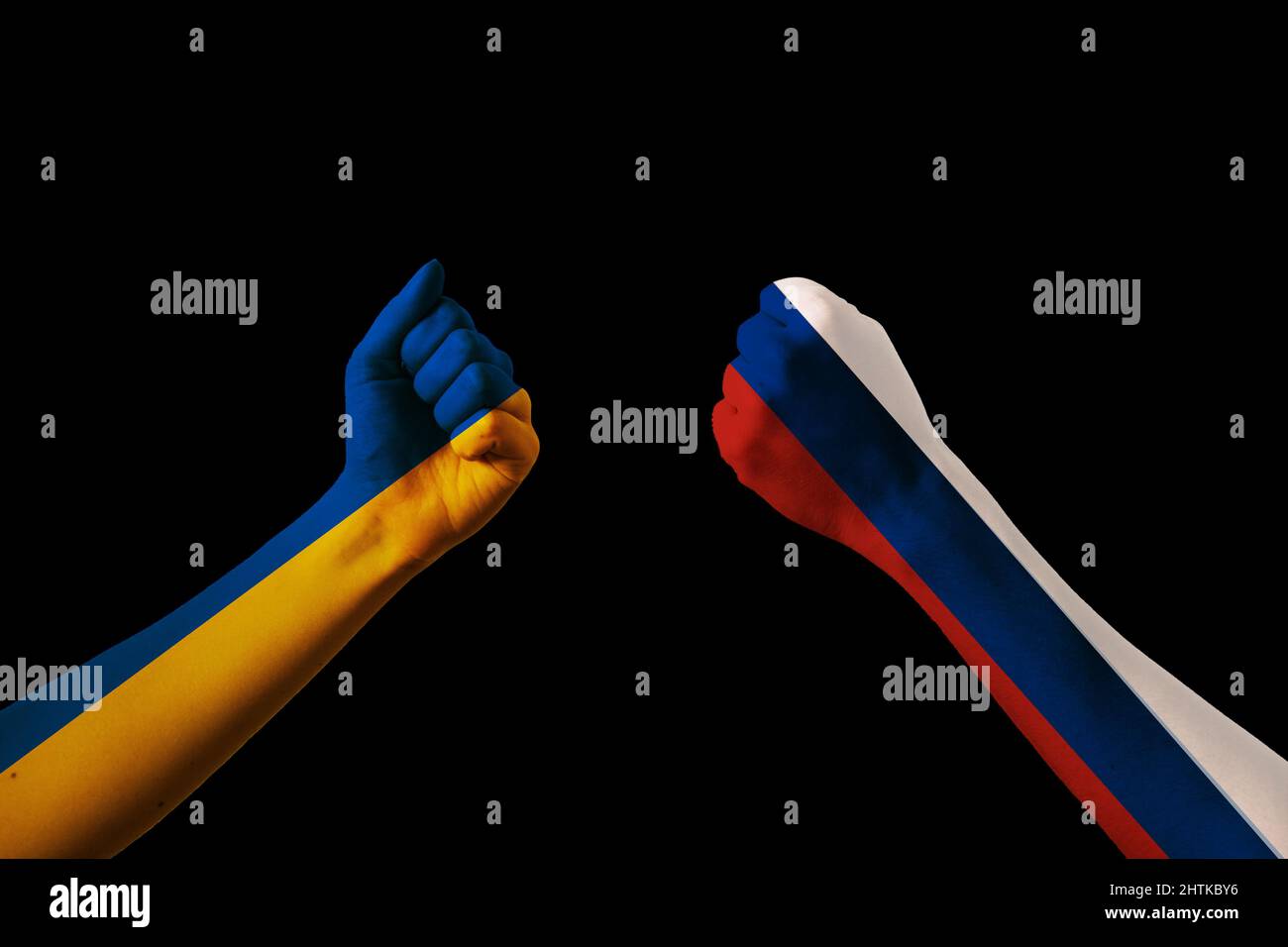 Fist fight flags of Ukraine and russia on black background. Putin ...