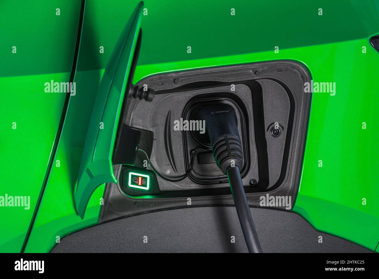 Electric vehicle - Mobility - E-Car charging on charge station. Eco ...