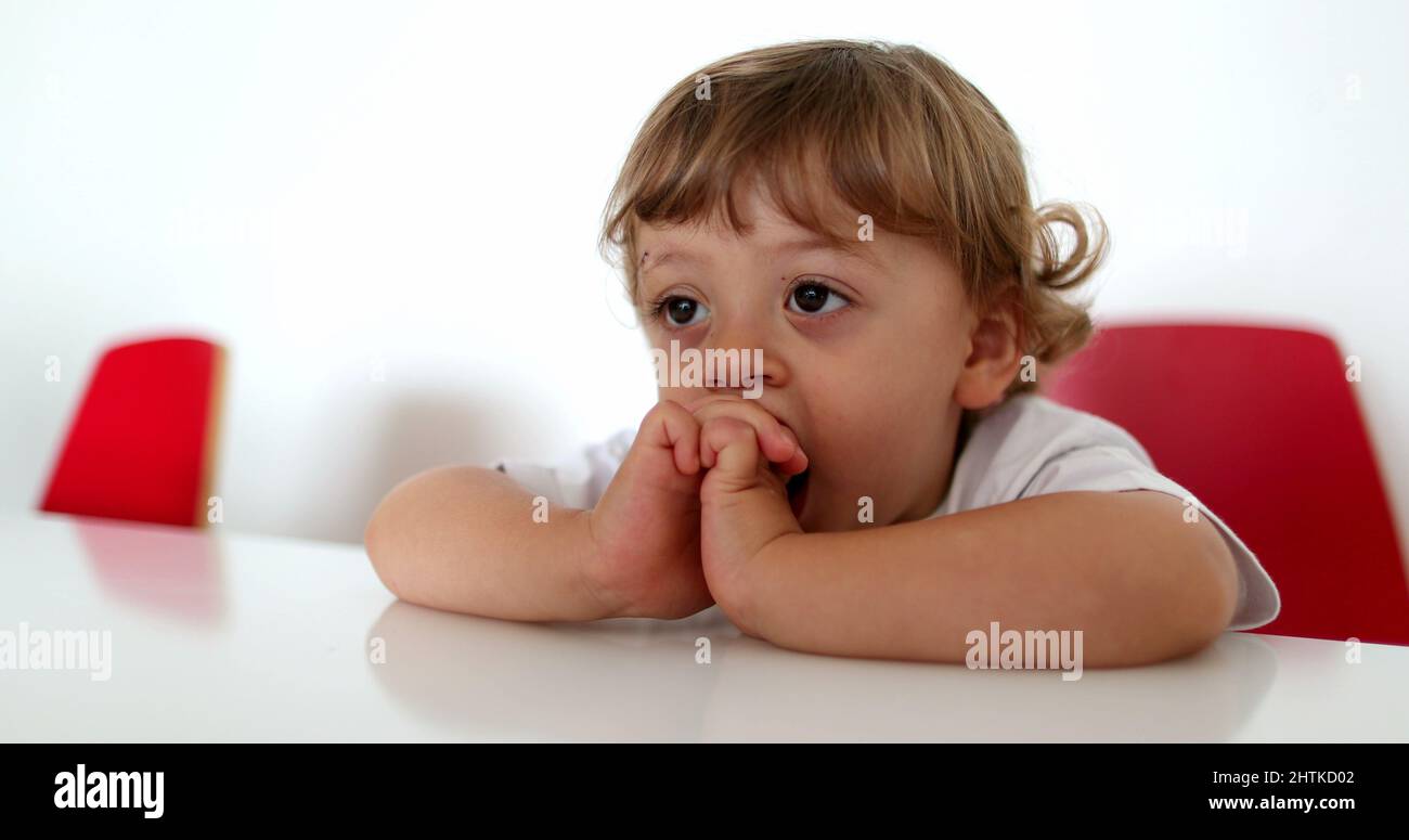 Toddler boy face close-up watching cartoon, hypnotized child by screen ...