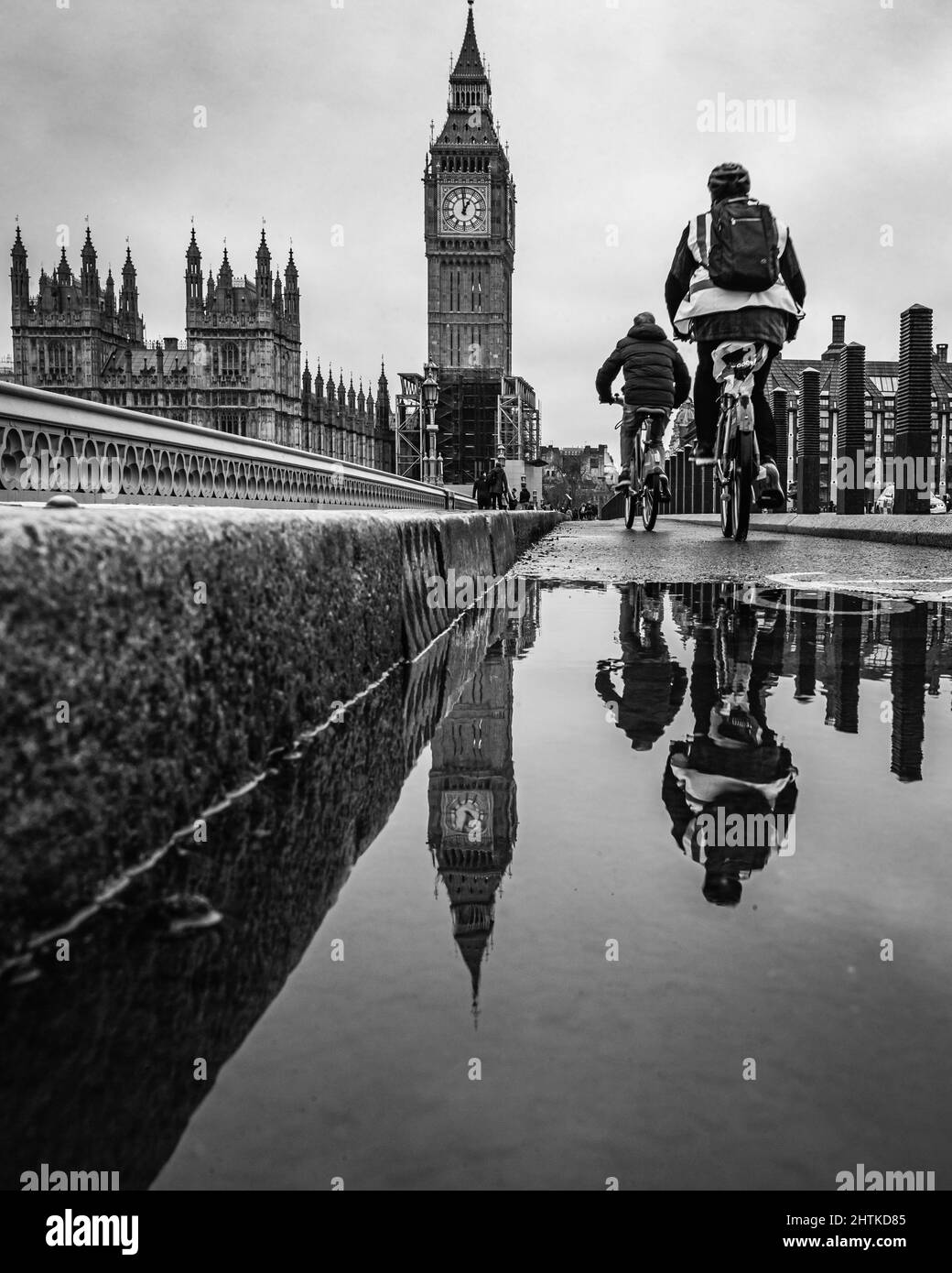 Cyclists reflection on Westminster Bridge in London Stock Photo - Alamy