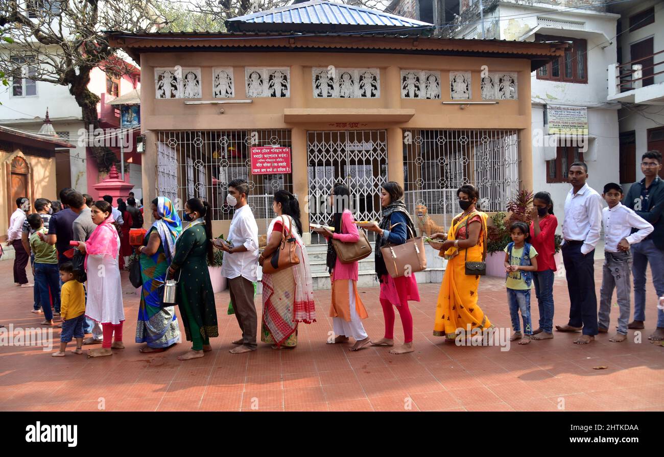 Guwahati, Guwahati, India. 1st Mar, 2022. Hindu devotees queue to offer ...