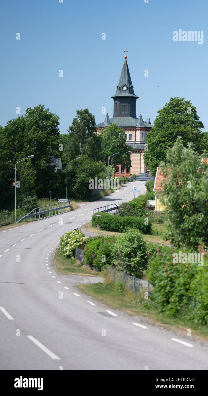 Vertical shot of a road leading to a modern building in Nybro Kommun ...