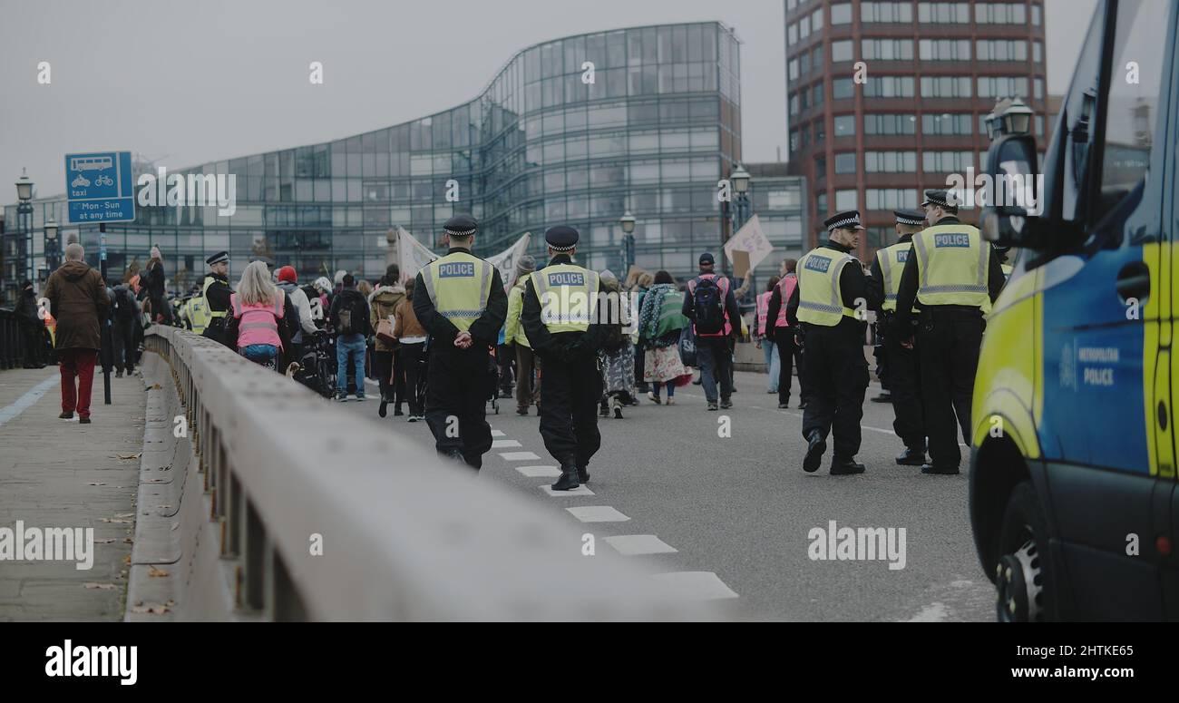 London, UK - 11 20 2021: Police officers and a police van on Lambeth ...