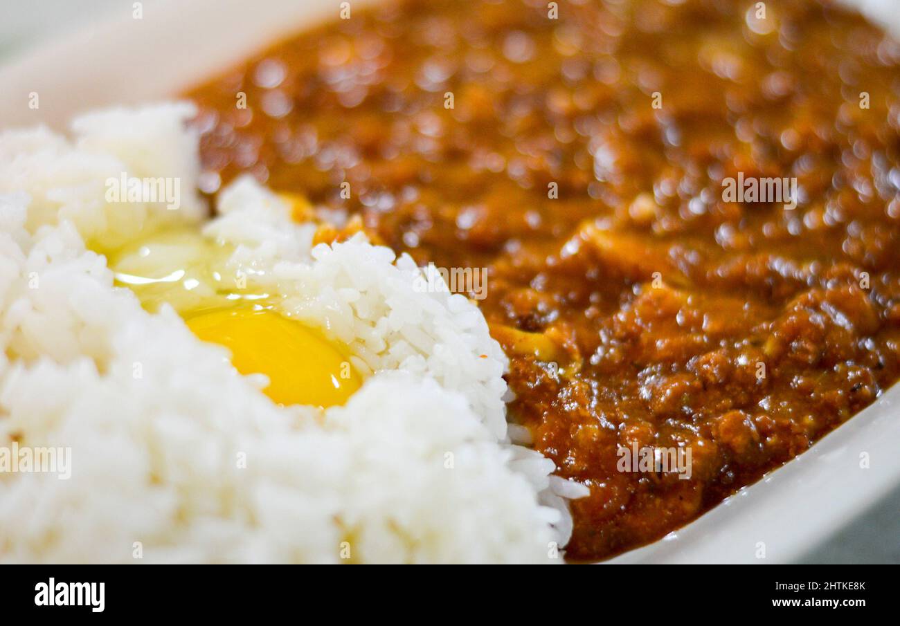 Hong Kong local dish minced beef rice with raw egg in centre Stock ...