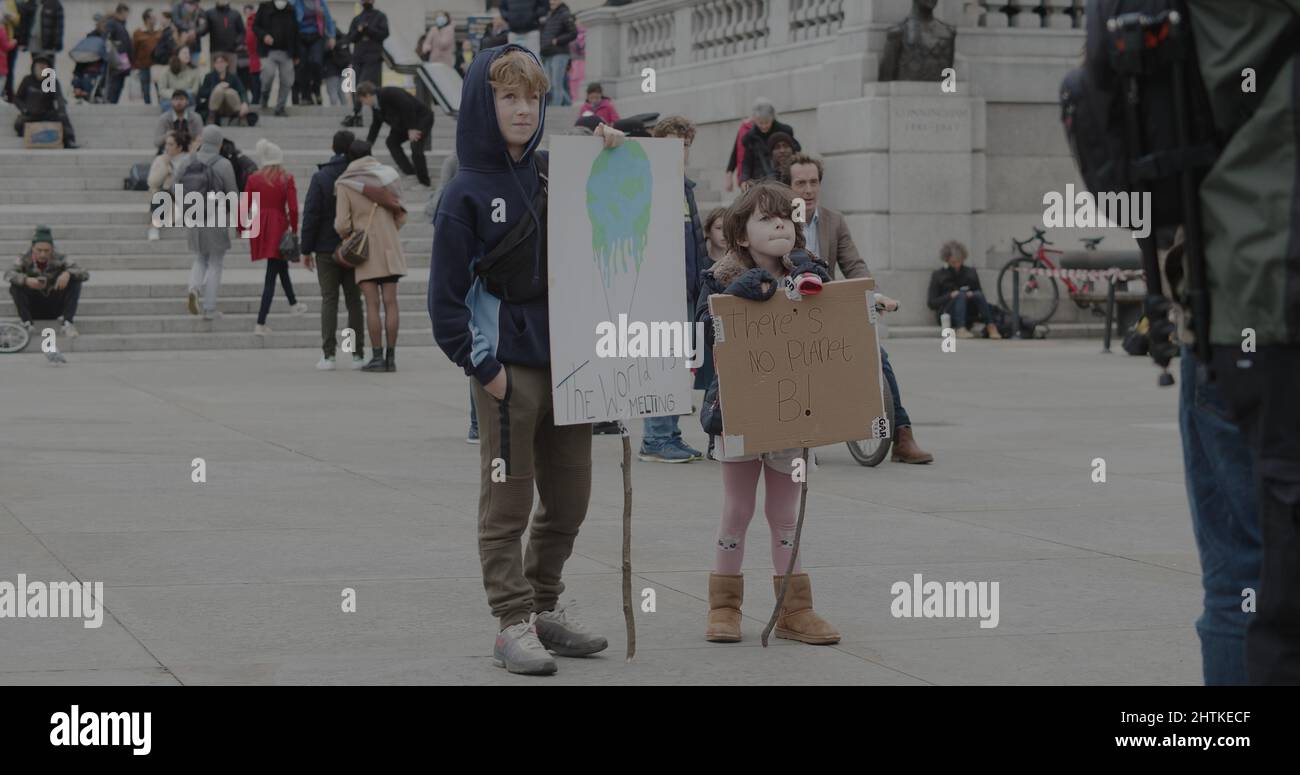 London, UK -11 06 2021: Two children activists holding climate change ...
