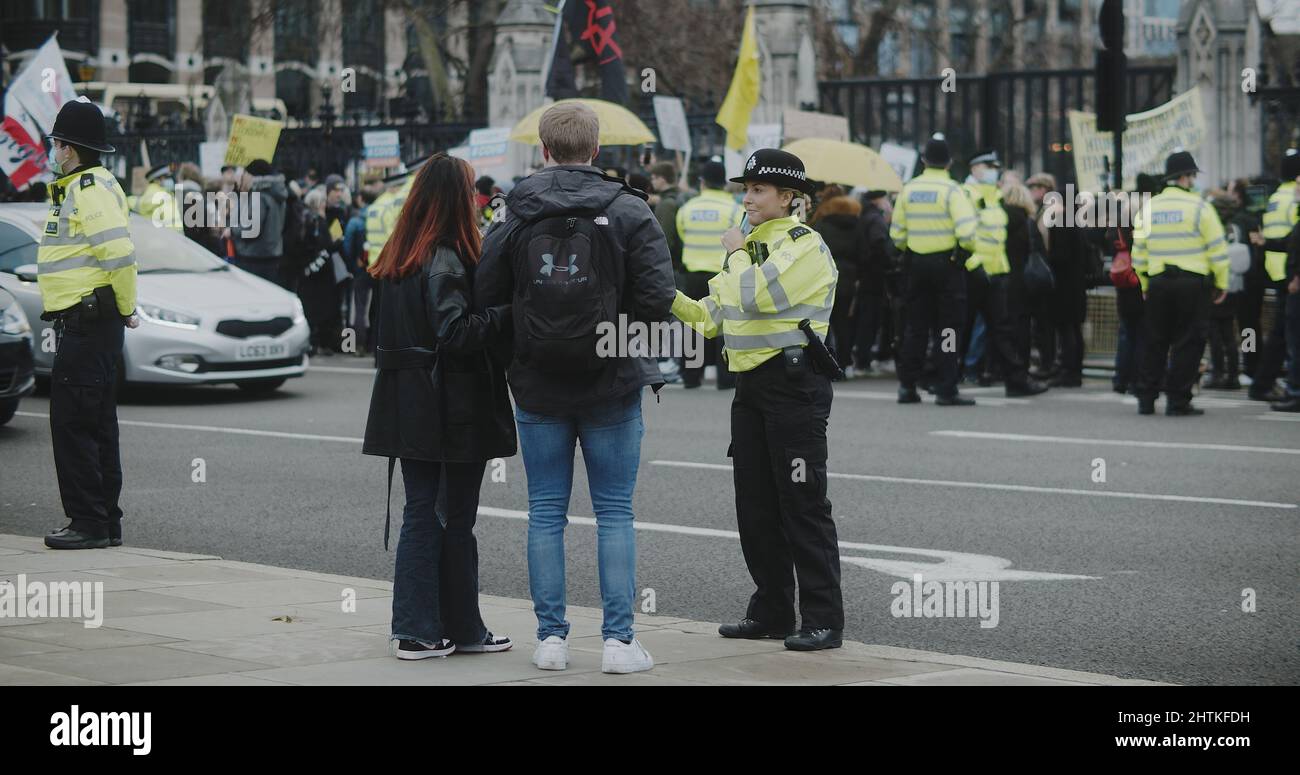 London, UK - 12 13 2021: A female metropolitan police officer on duty ...