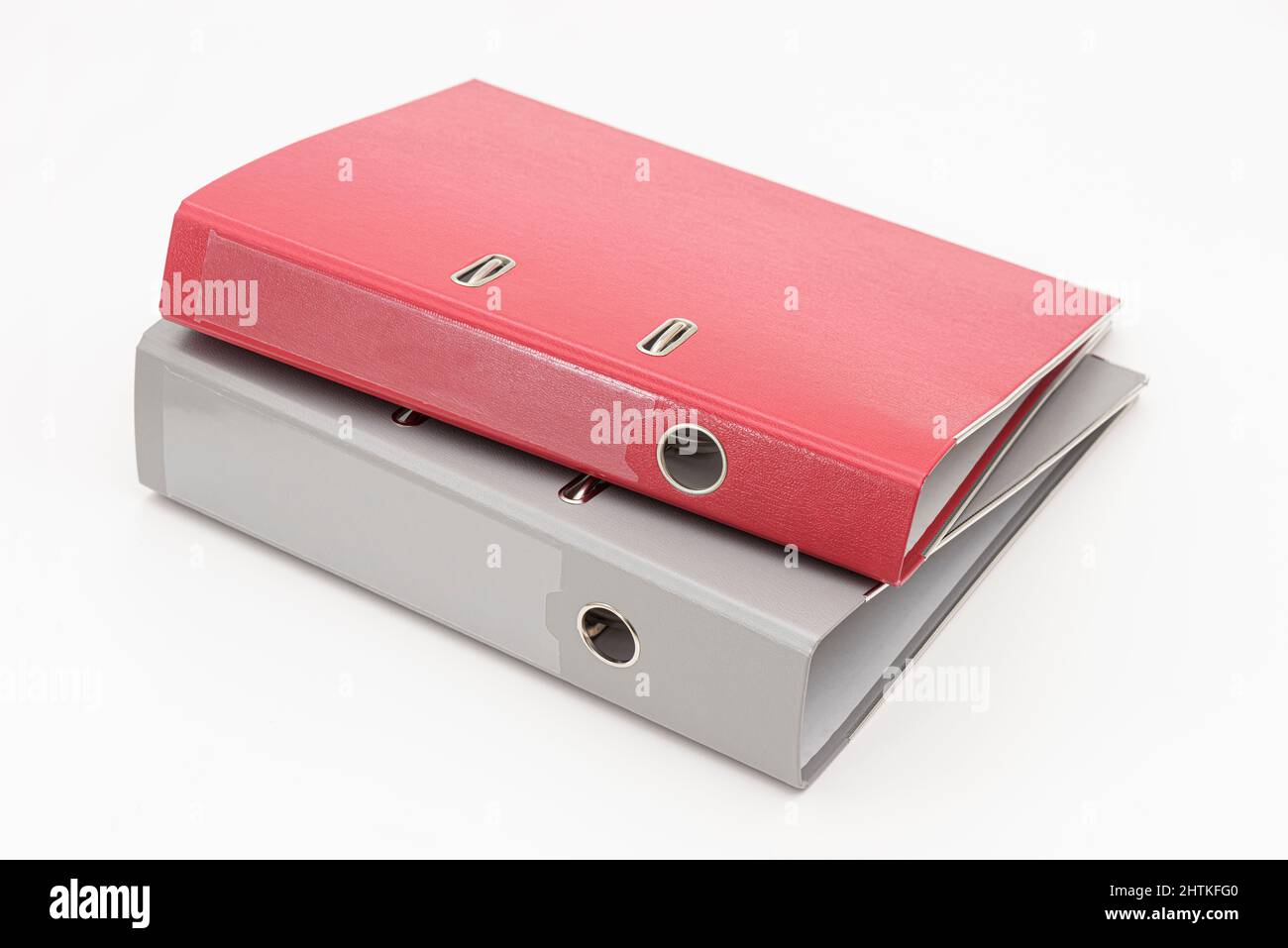 rey and red office folder on white background Stock Photo - Alamy