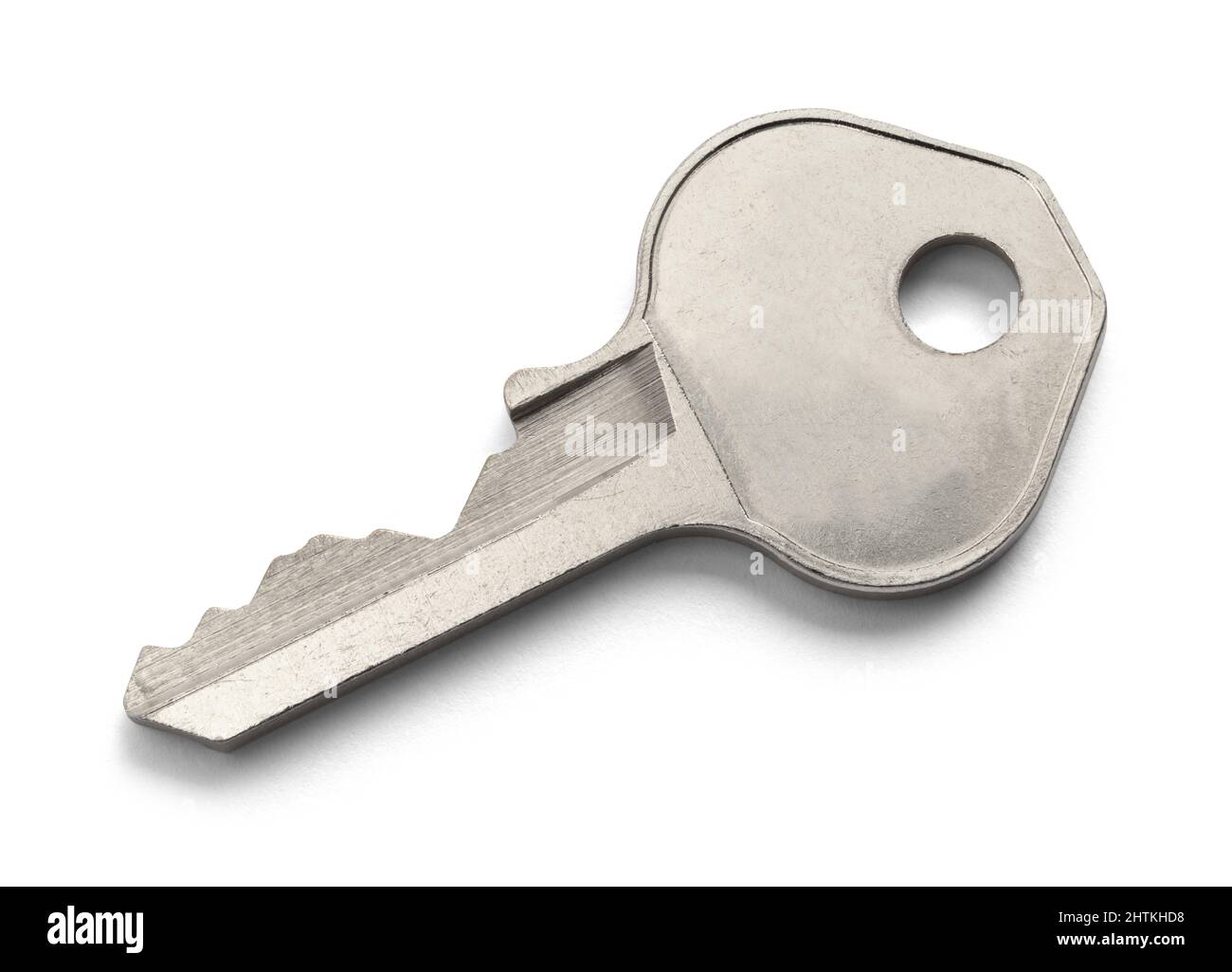 Small Metal Key Cut Out On White Stock Photo - Alamy