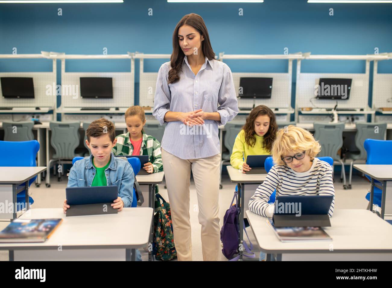 Standing watching hi-res stock photography and images - Alamy