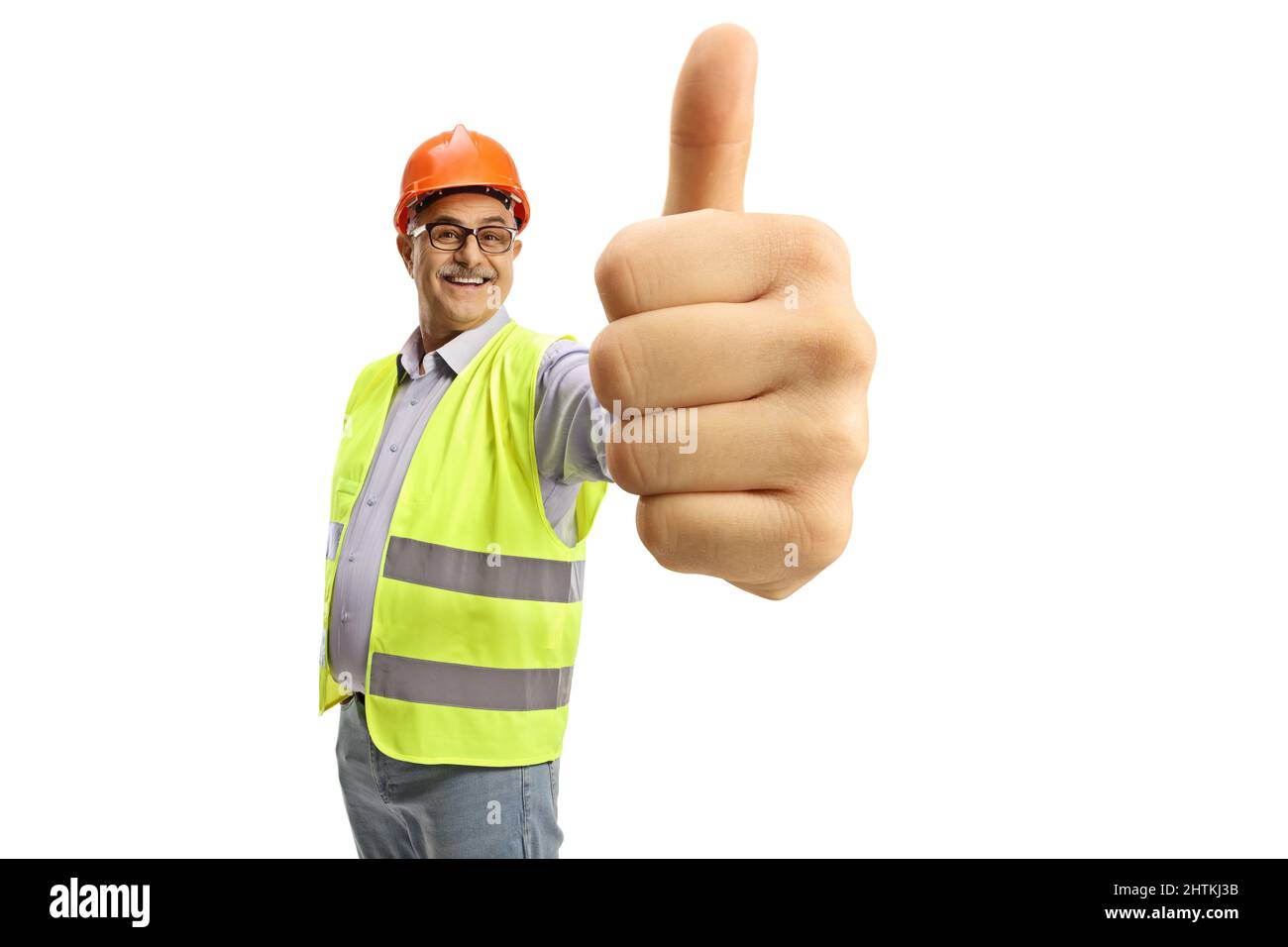Cheerful mature male engineer showing thumbs up isolated on white ...