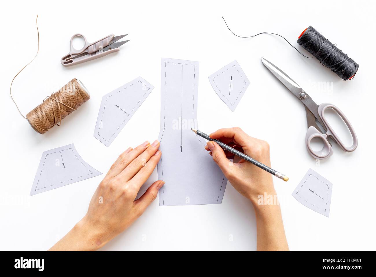 Hands designer work fabric Cut Out Stock Images & Pictures - Alamy