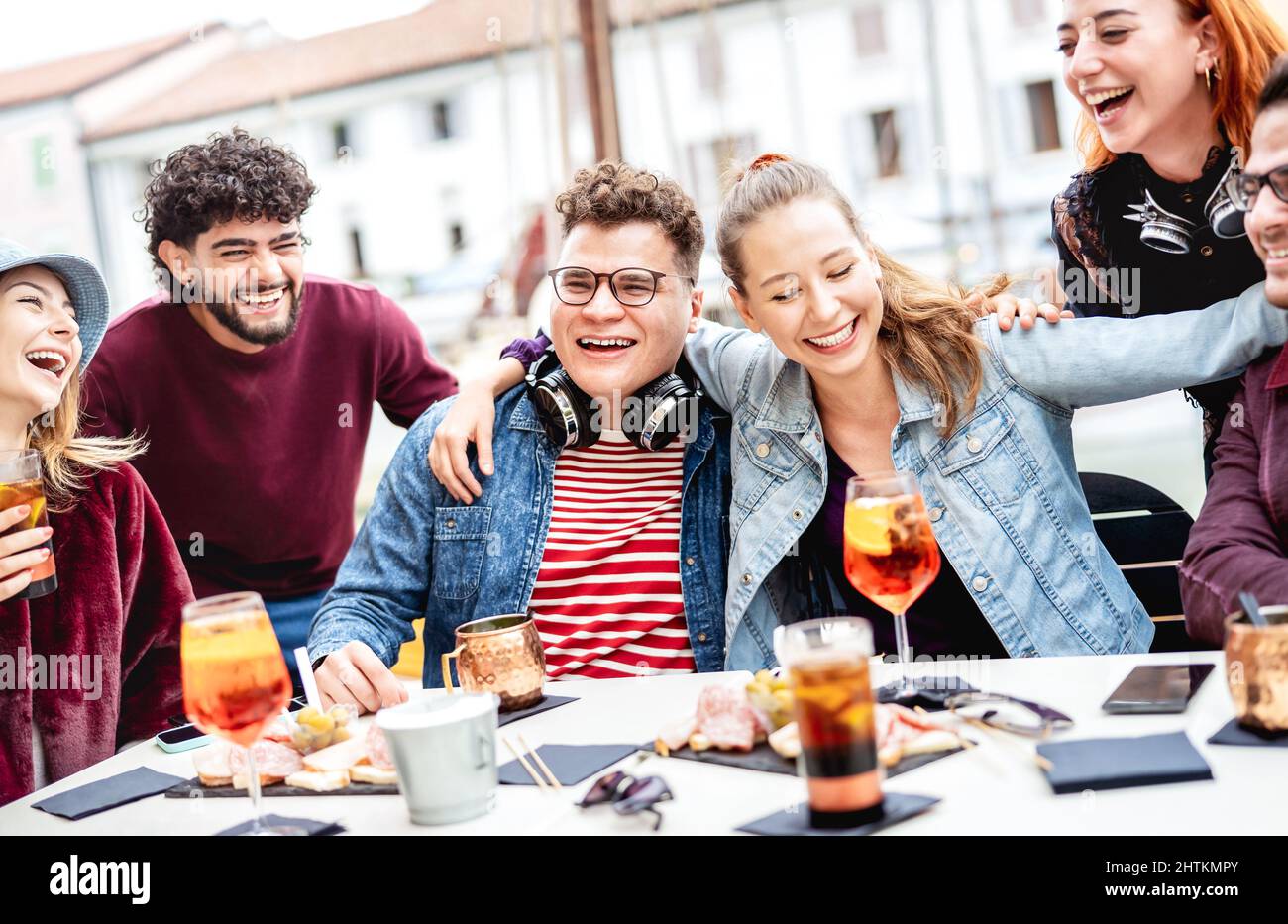 Trendy people on genuine fun moment at fancy pub restaurant - Life ...