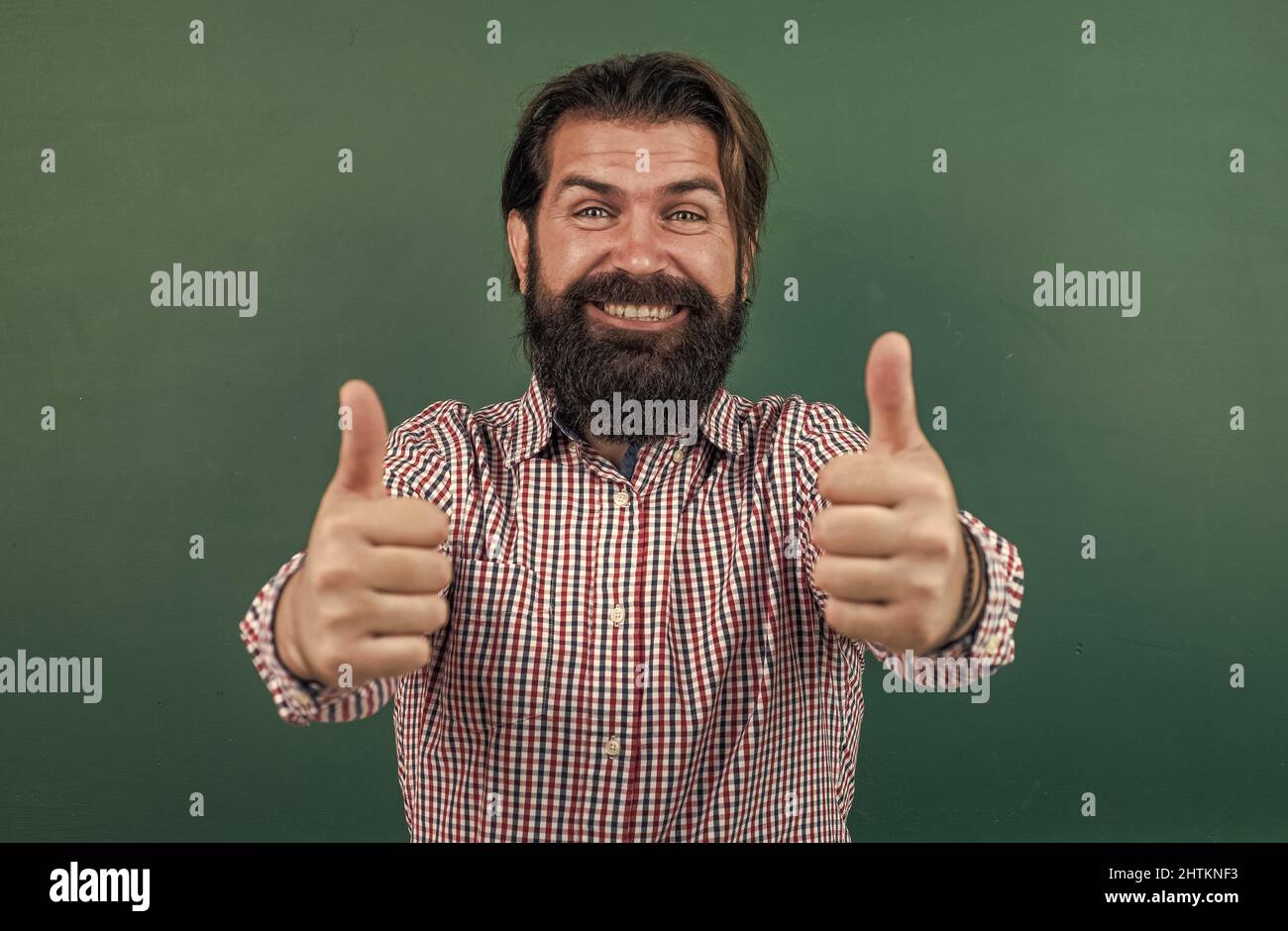 happy teachers day. thumb up for success. brutal man with beard wear ...