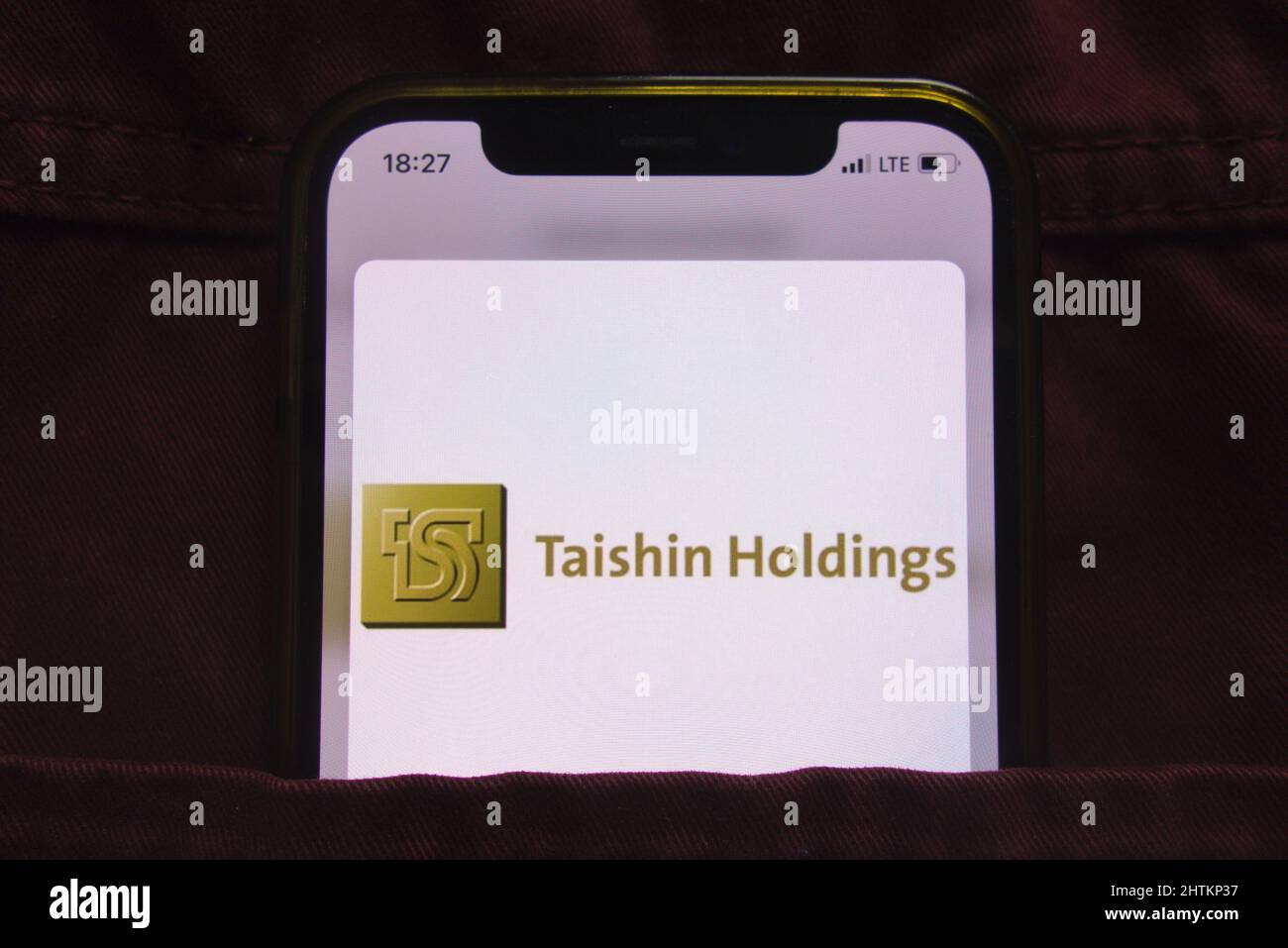 KONSKIE, POLAND - February 27, 2022: Taishin Holdings logo displayed on ...