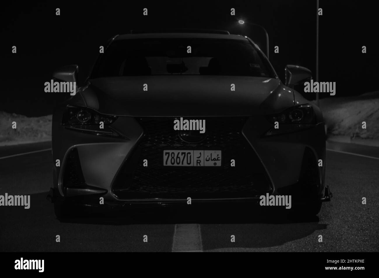 Sports car Lexus IS350 on a street in Muscat, Oman at night Stock Photo ...