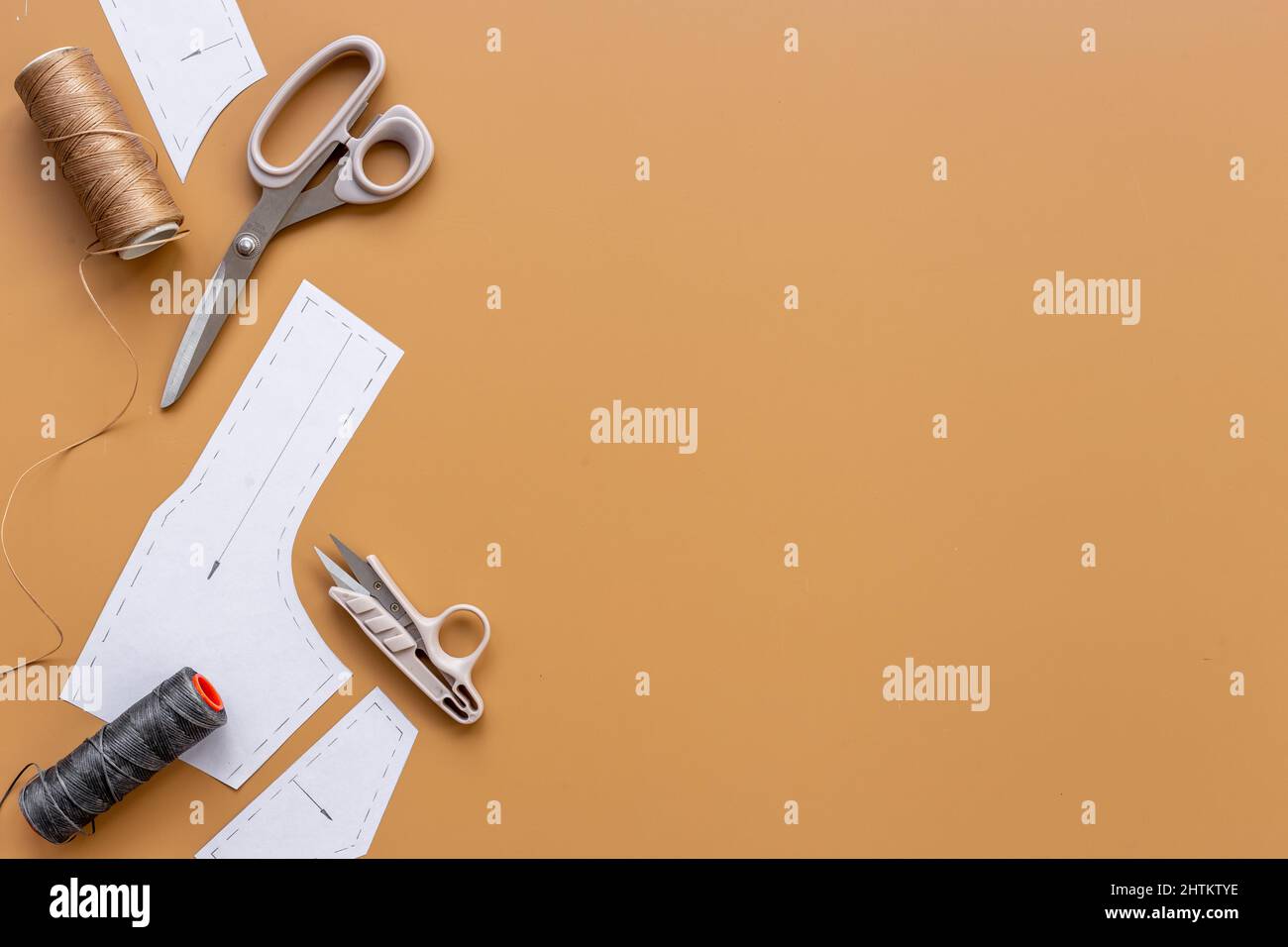 Sewing background. Tailor tools dress patterns in workshop Stock Photo ...