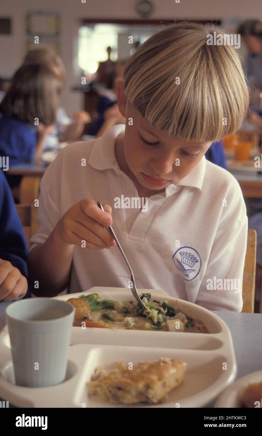 primary school boy wincing at his school dinner Stock Photo - Alamy