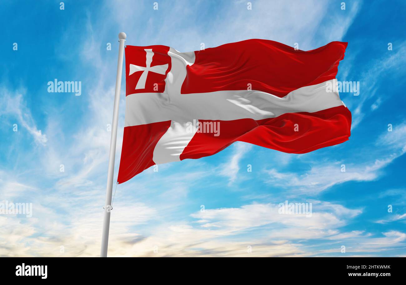 flag of Volhynian region , Ukraine at cloudy sky background on sunset ...