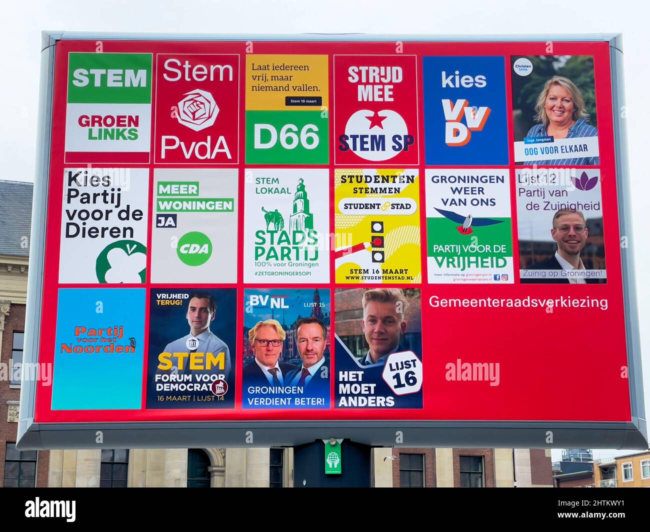 Billboard with posters for the municipal elections in the Netherlands ...