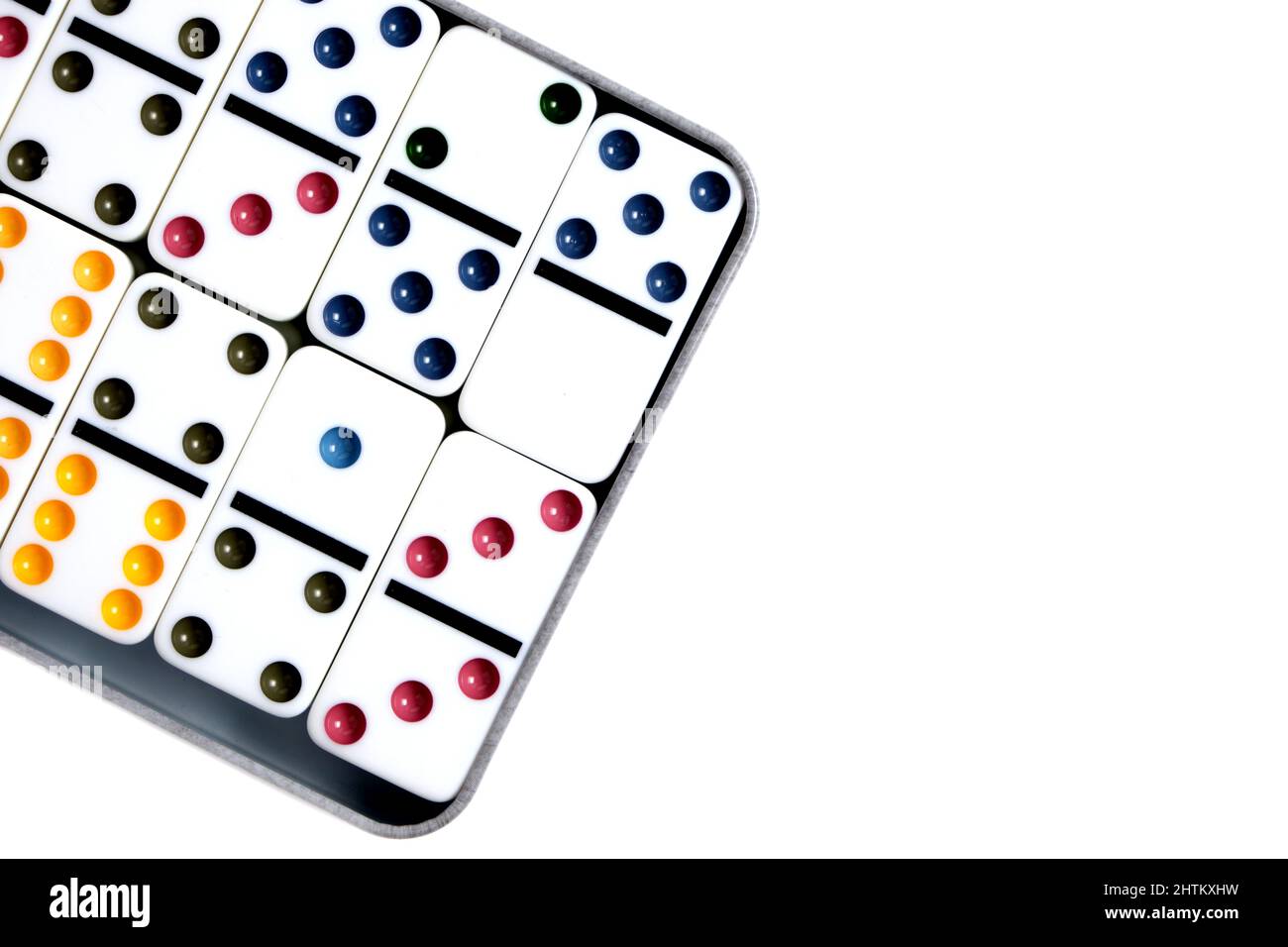 Dominoes with colorful coloring white background in package Stock Photo ...