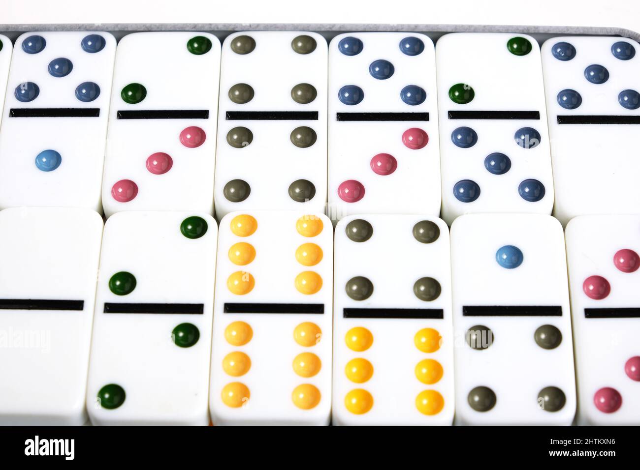 Dominoes with colorful coloring on a white background Stock Photo - Alamy