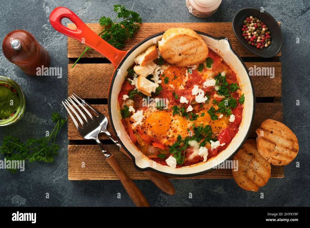 Shakshuka Homemade fried eggs poached in sauce of tomatoes, olive oil ...