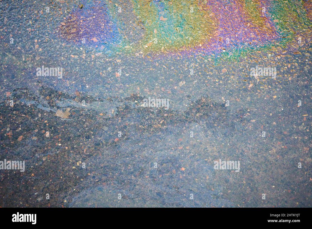Oil rainbow in puddle hi-res stock photography and images - Alamy