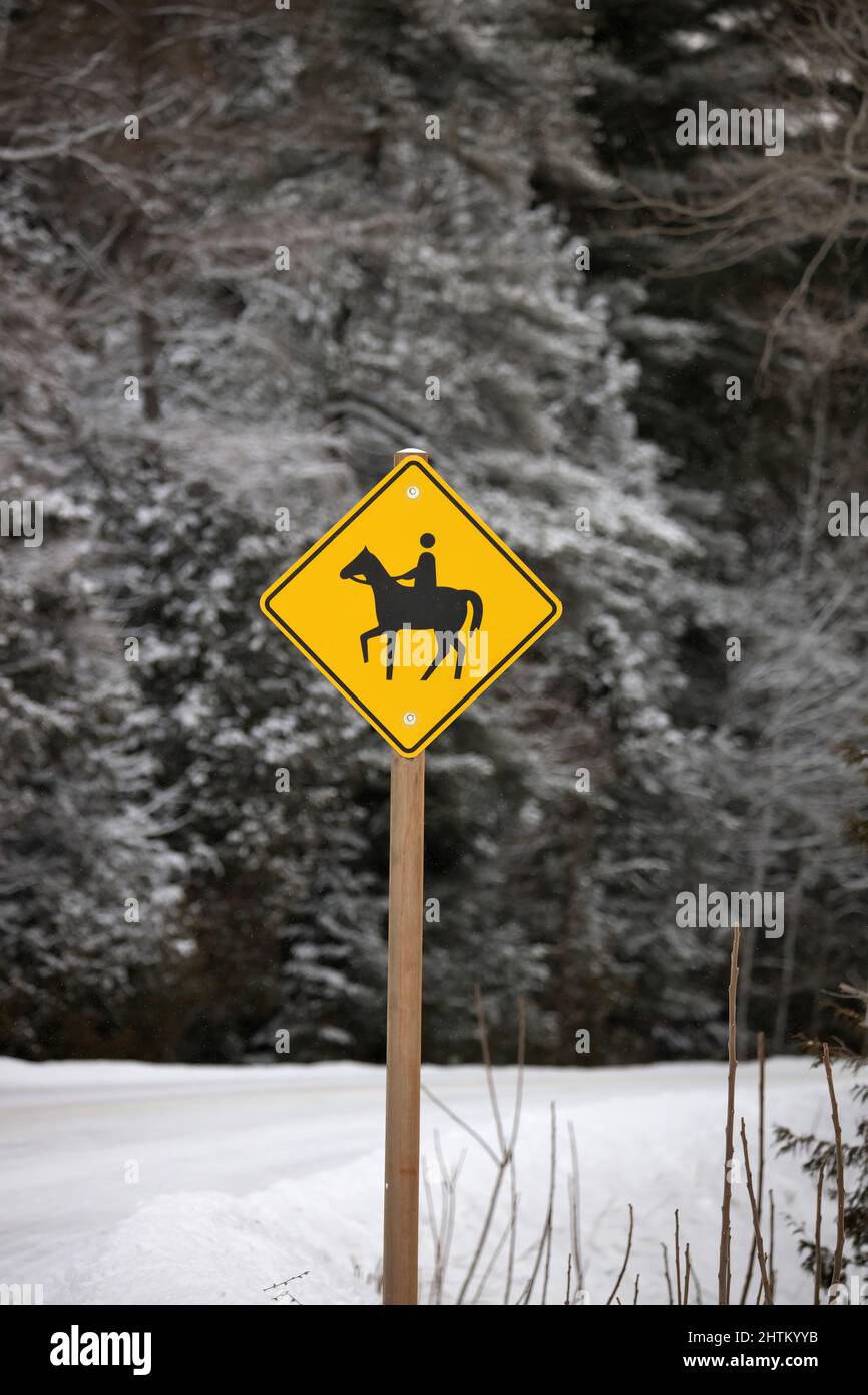 Yellow Caution Horse Riding Sign in a Rural Setting in Winter Stock ...